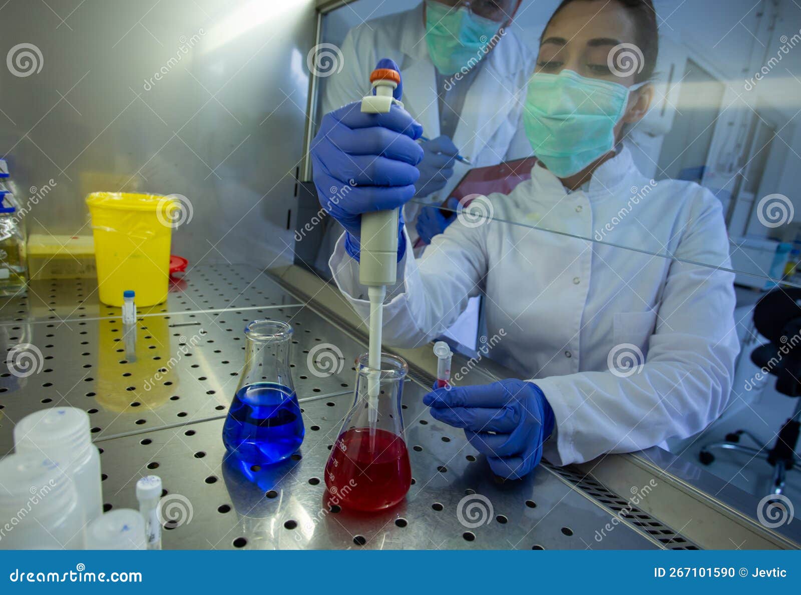 Biologist Working in Glow Box in Laboratory Stock Photo - Image of ...