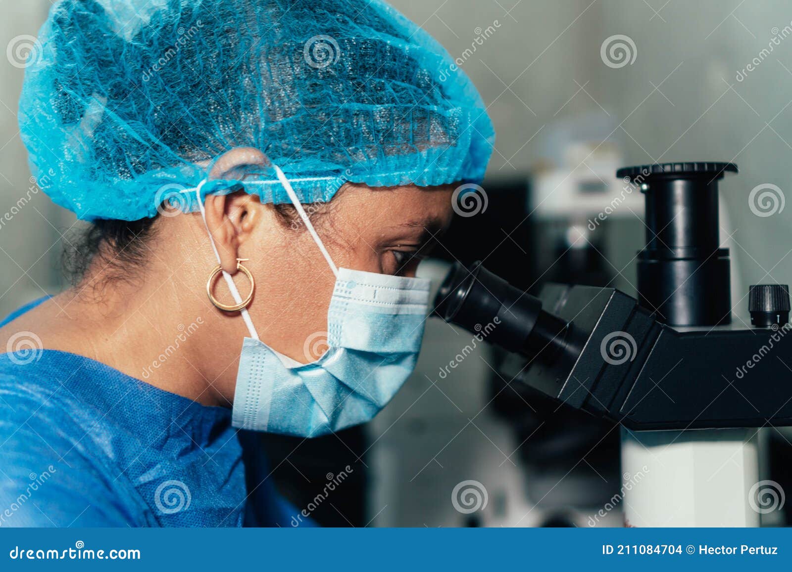 Biologist Working with the Microscope in the Laboratory Stock Photo ...