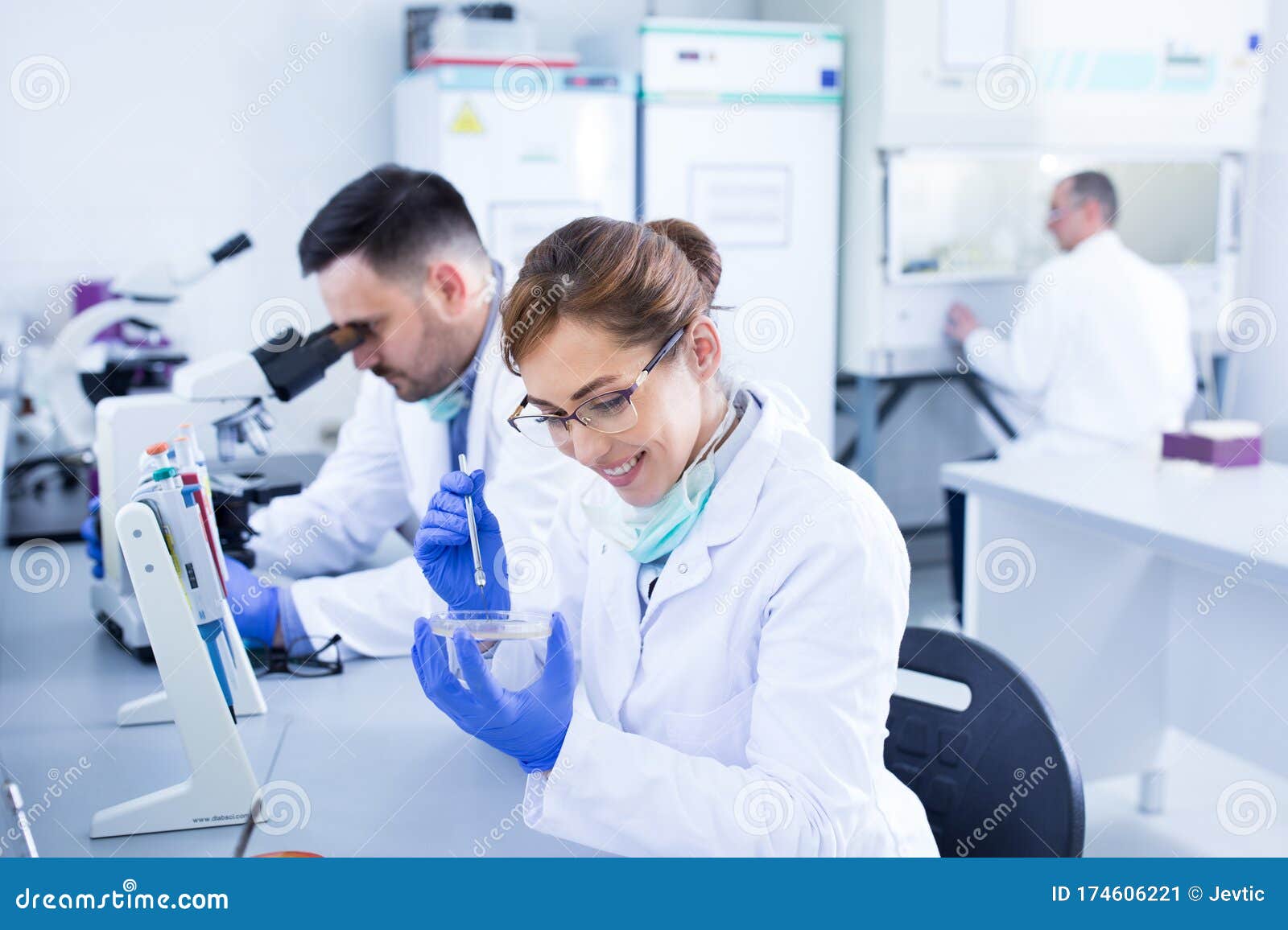 Biologists Working on Samples in Laboratory Stock Image - Image of ...