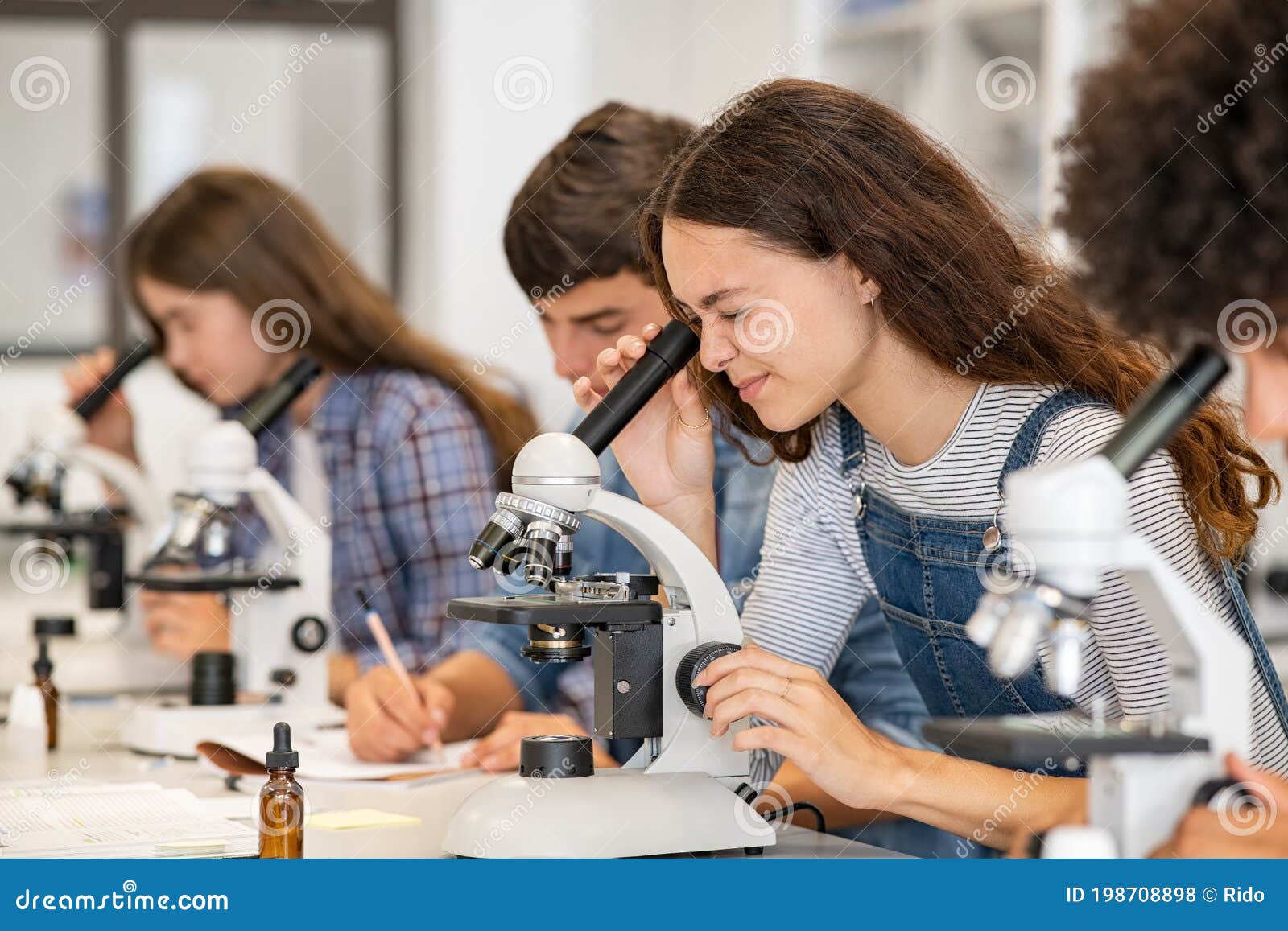 Biology Class at High School Lab Stock Photo - Image of people ...