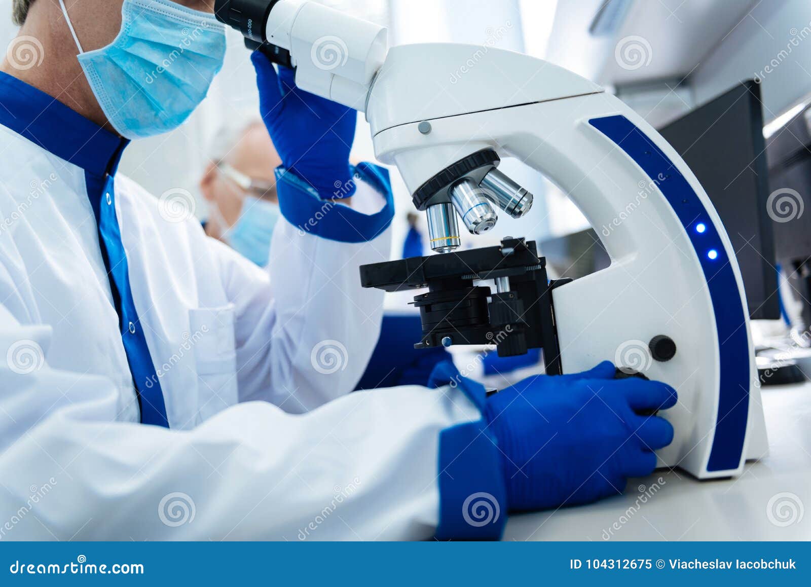 Experienced Researcher Using a Microscope in the Lab Stock Image ...