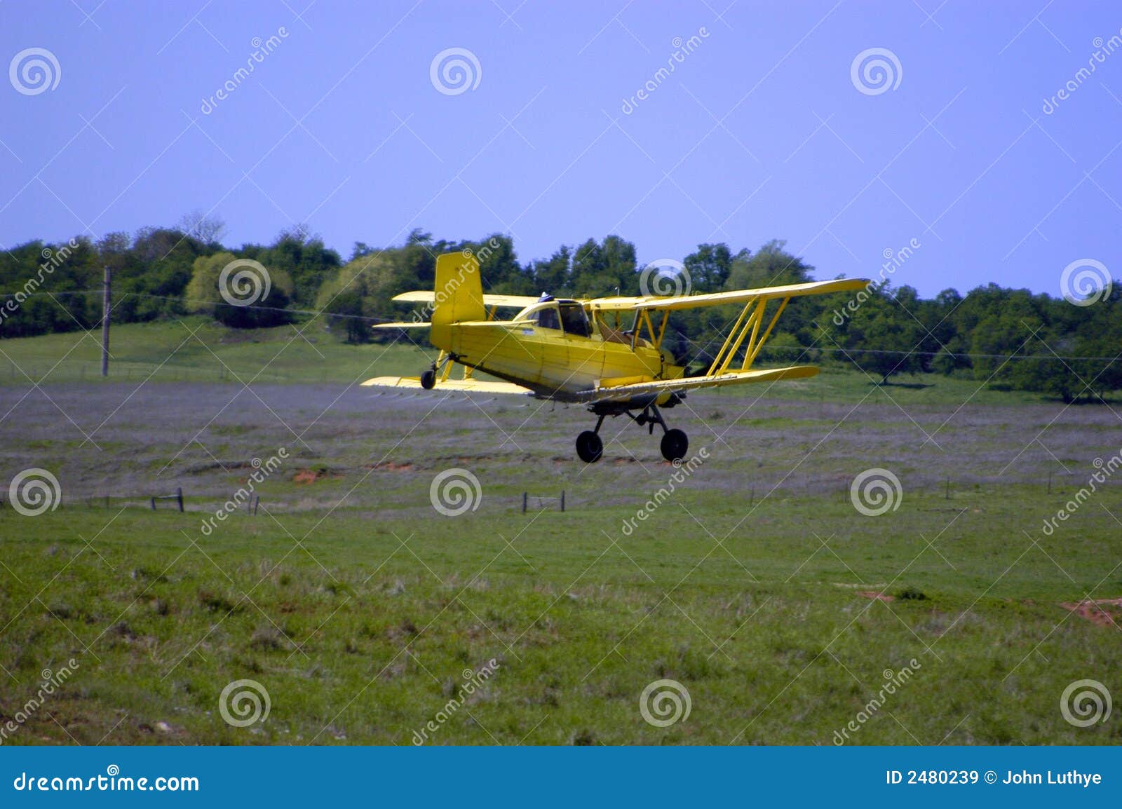 Biplane Crop Duster in Action Stock Image - Image of biplane, farming ...