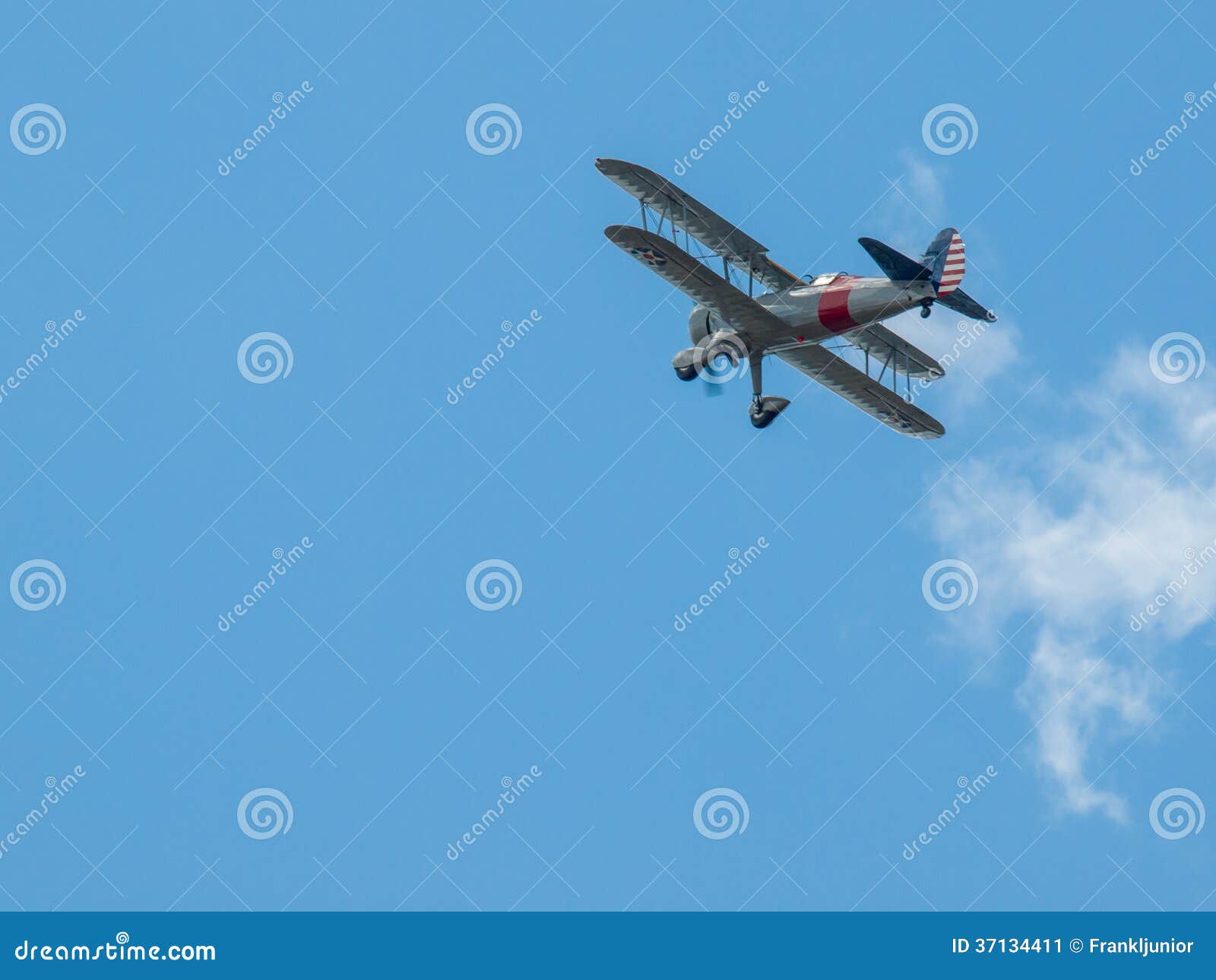 A Biplane in Flight stock image. Image of giving, landing - 37134411