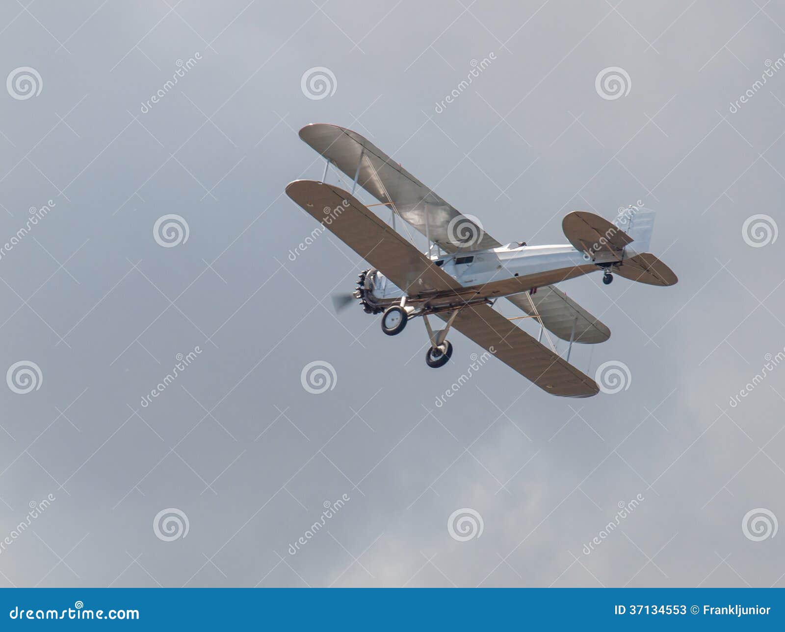 A Biplane in Flight stock image. Image of aviation, blades - 37134553