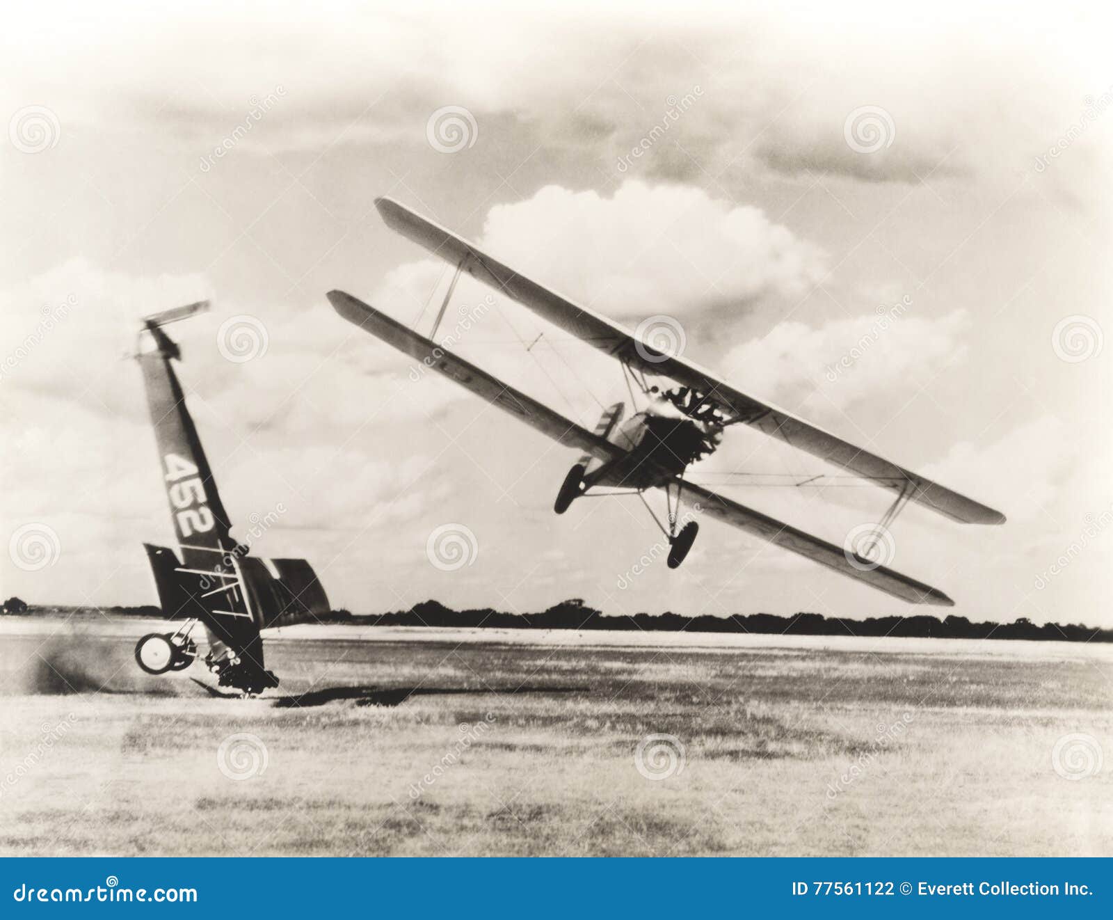 Biplane Flying Past Crash on Field Stock Photo - Image of 1910s1940s ...