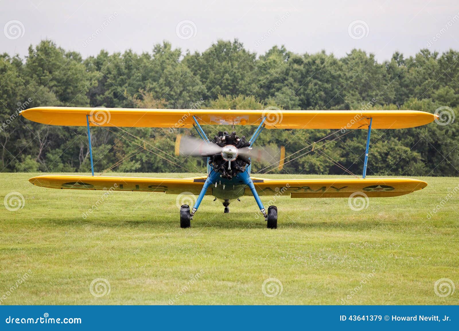 Biplane landing on field stock image. Image of sport - 43641379