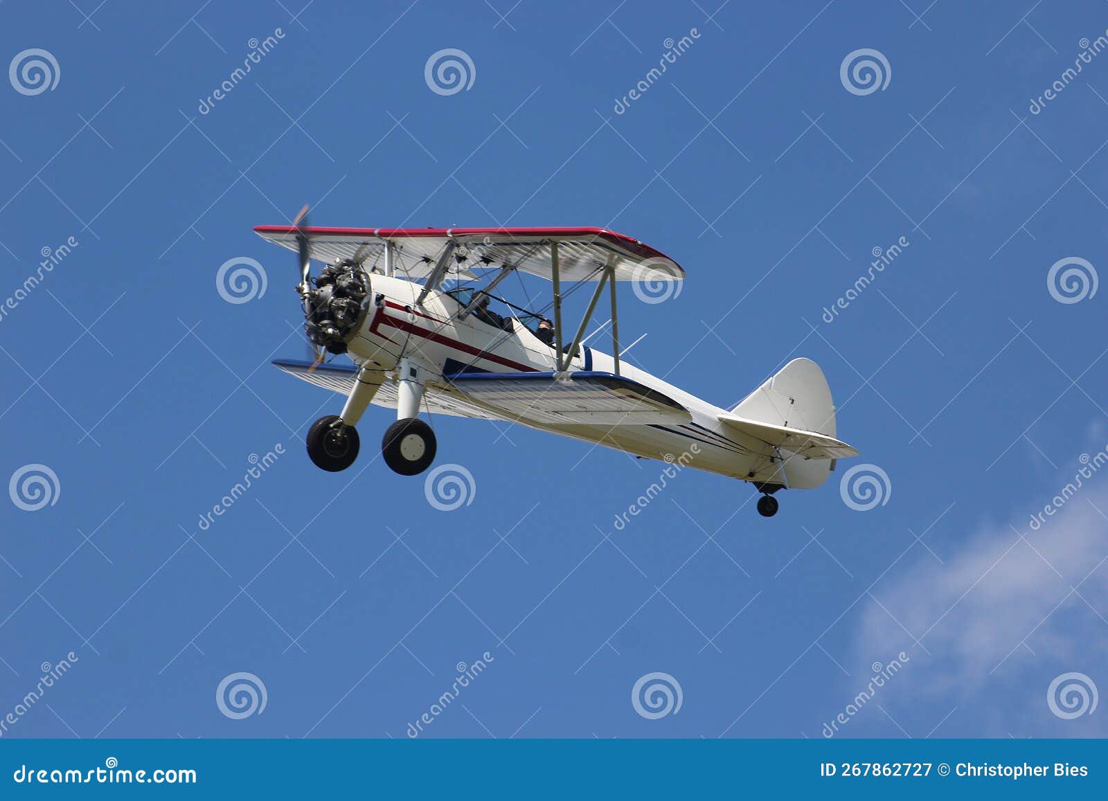 Biplane in Red, White and Blue Flying Editorial Photography - Image of aircraft, propeller ...