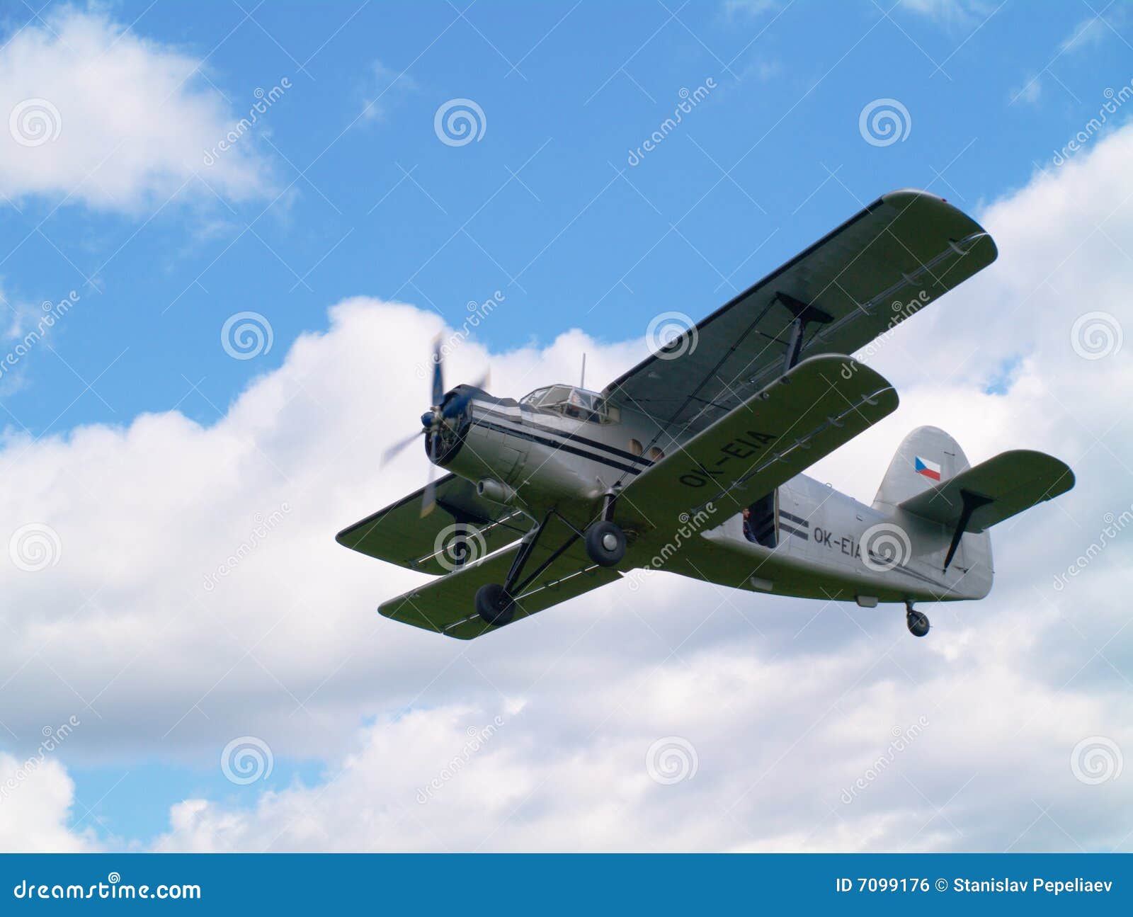 Biplane in the sky stock photo. Image of flight, clouds - 7099176