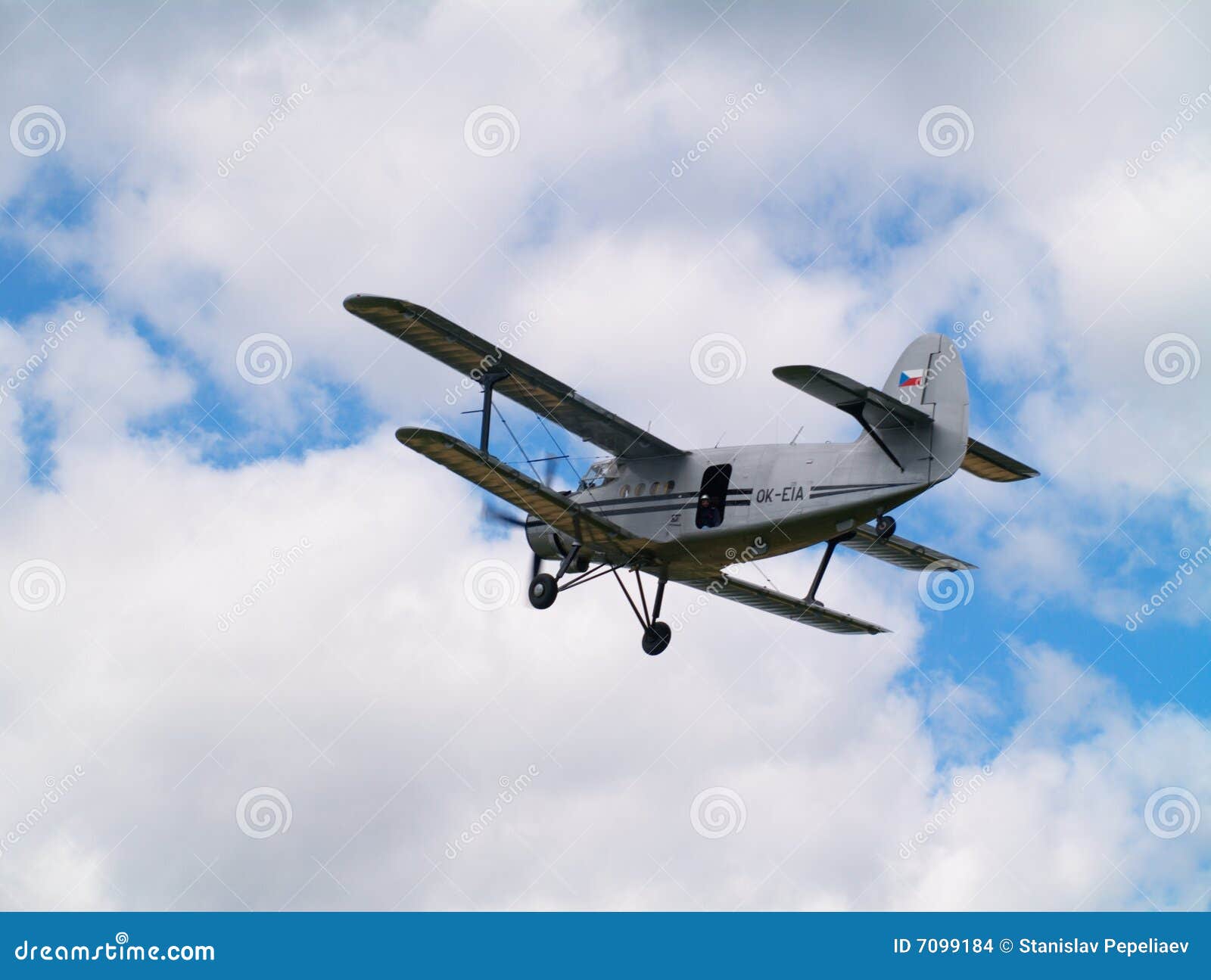 Biplane in the sky stock photo. Image of airfield, clouds - 7099184