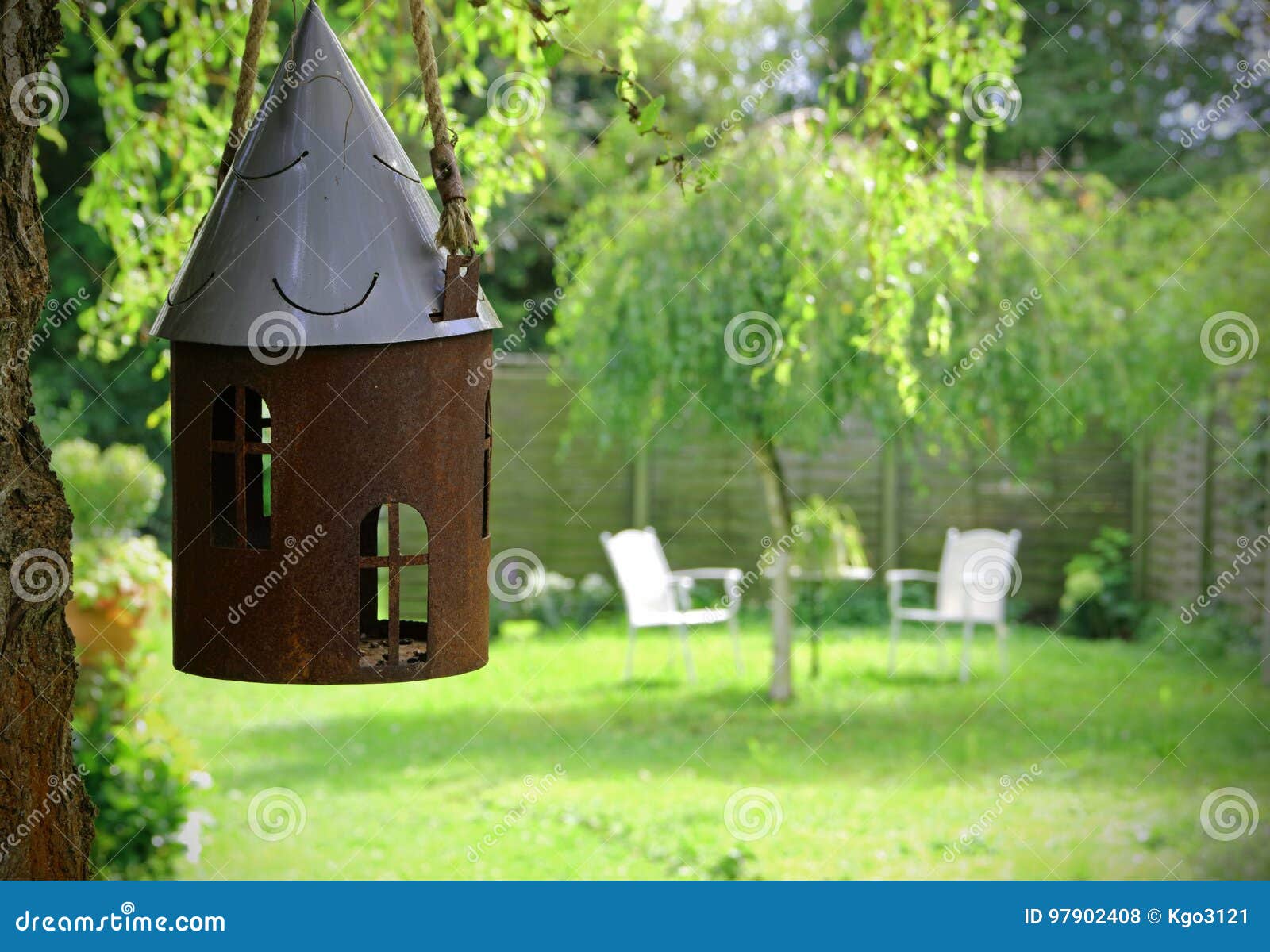 Bird box stock photo. Image of green, playful, tree, chairs - 97902408