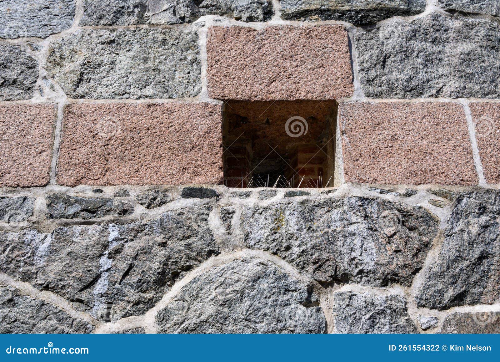 Bird Deterrent in Opening in Stone Castle Wall Stock Photo - Image of ...