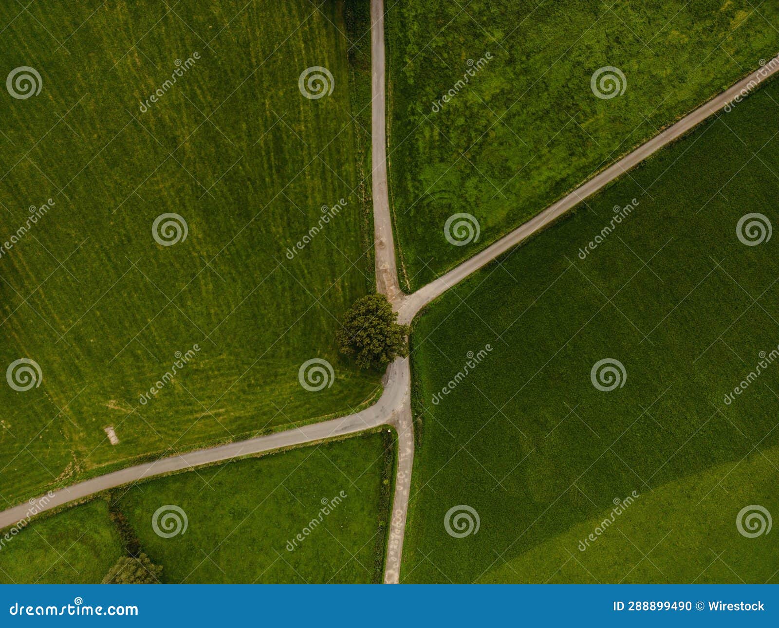 A Bird - Eye View of an Intersection in a Grass Area Stock Photo ...