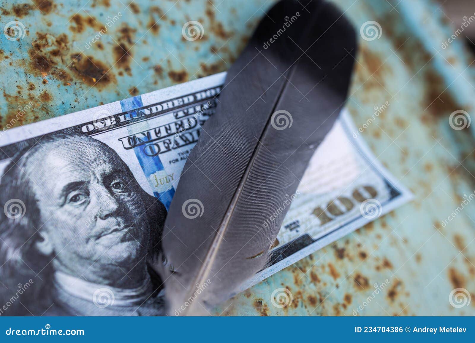 Bird Feather and Money on a Cold Surface of Old Metal Stock Photo ...