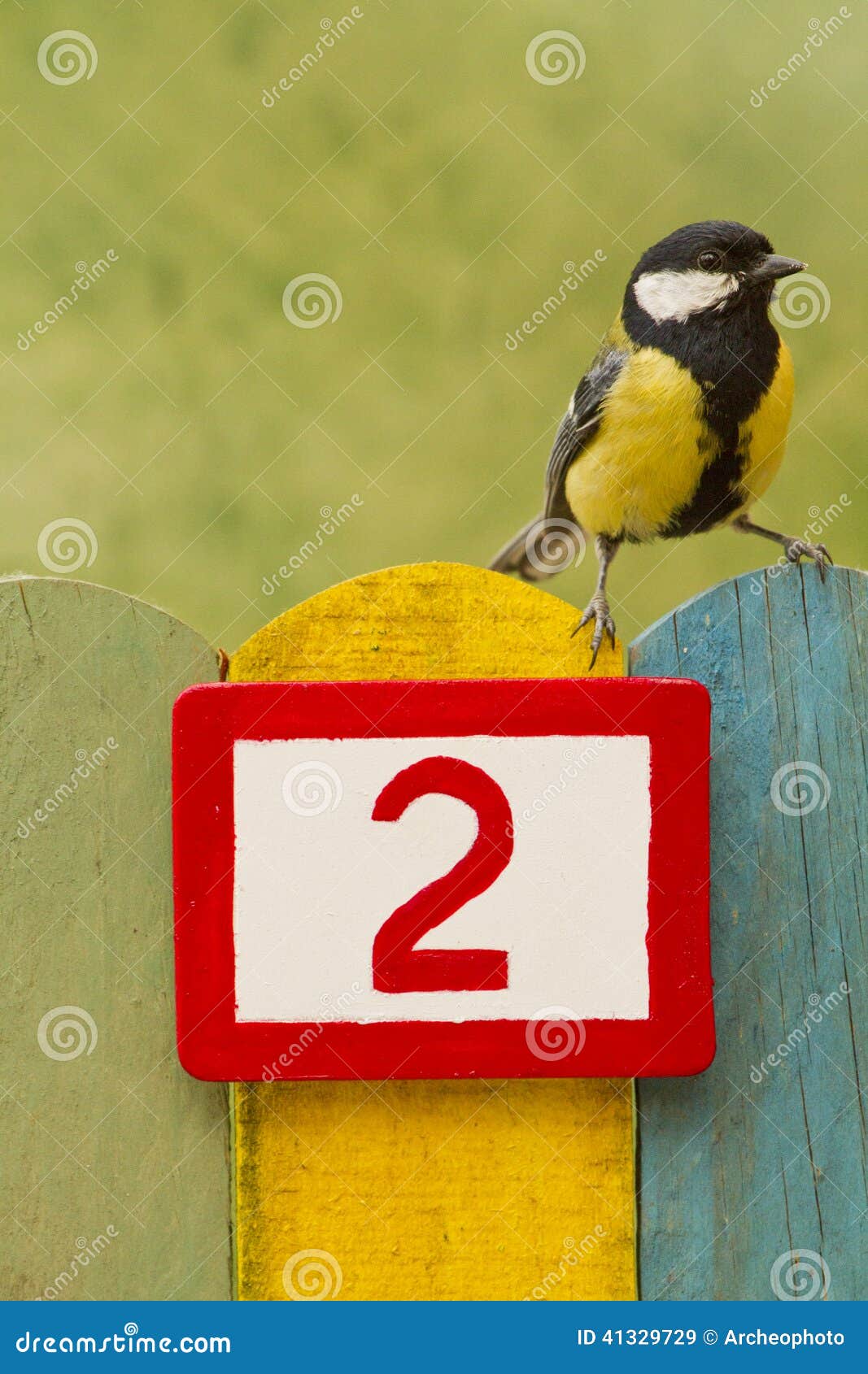 Bird Perched on a Fence with the Number Two Painted on it Stock Image ...