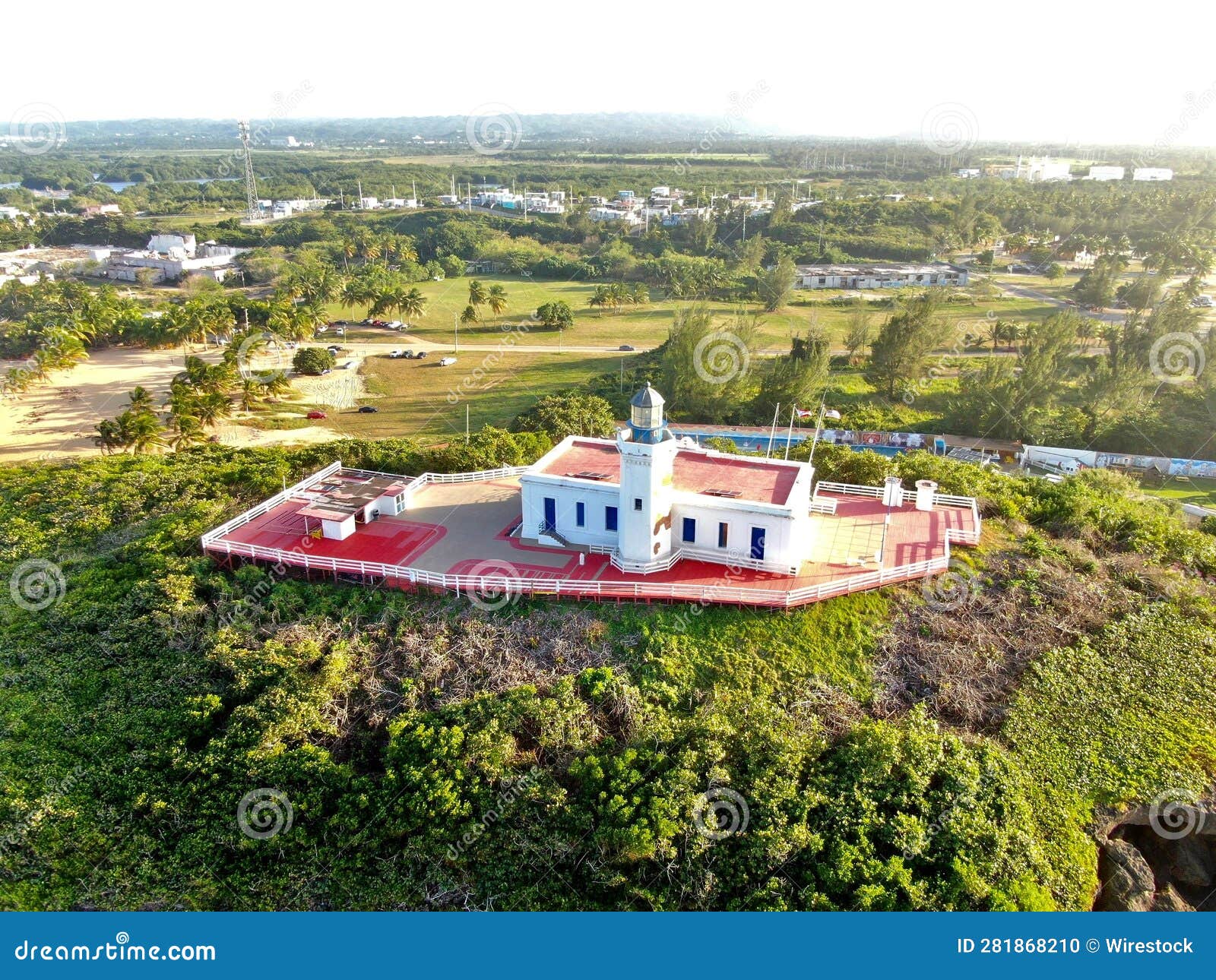 Bird S Eye View of the Lighthouse with Crystal Clear Waters, Sandy ...