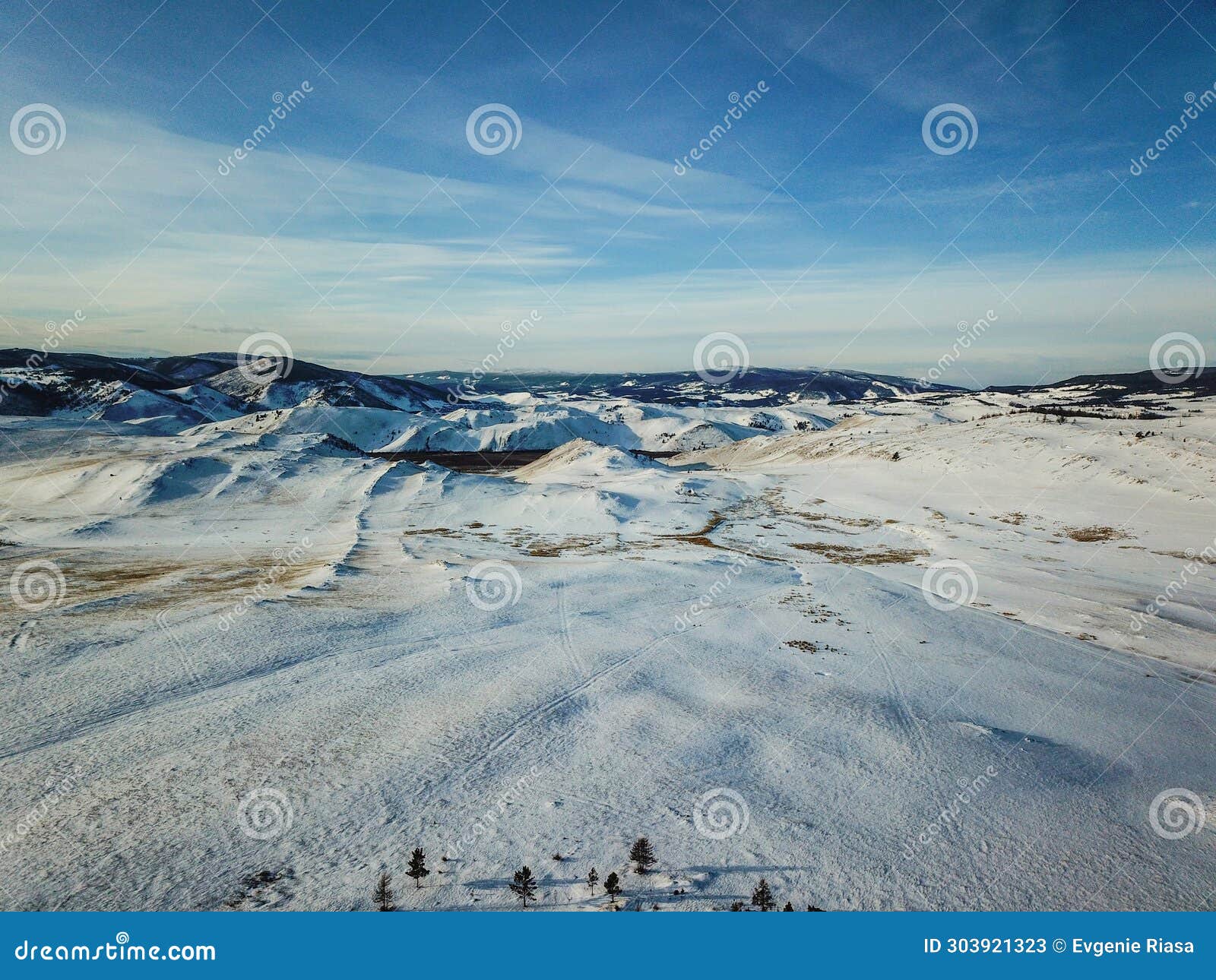 A Bird S Eye View of a Ridgeline Half-covered with Snow in a Forest ...