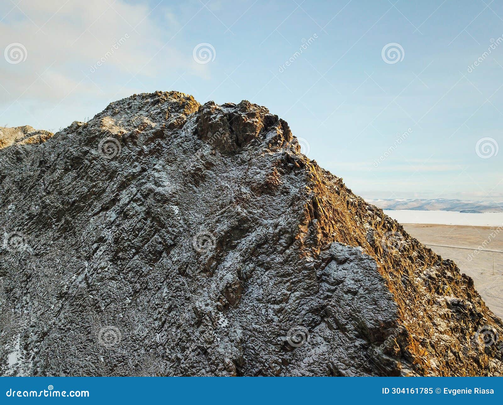 A Bird S Eye View of a Ridgeline Half-covered with Snow in a Forest ...
