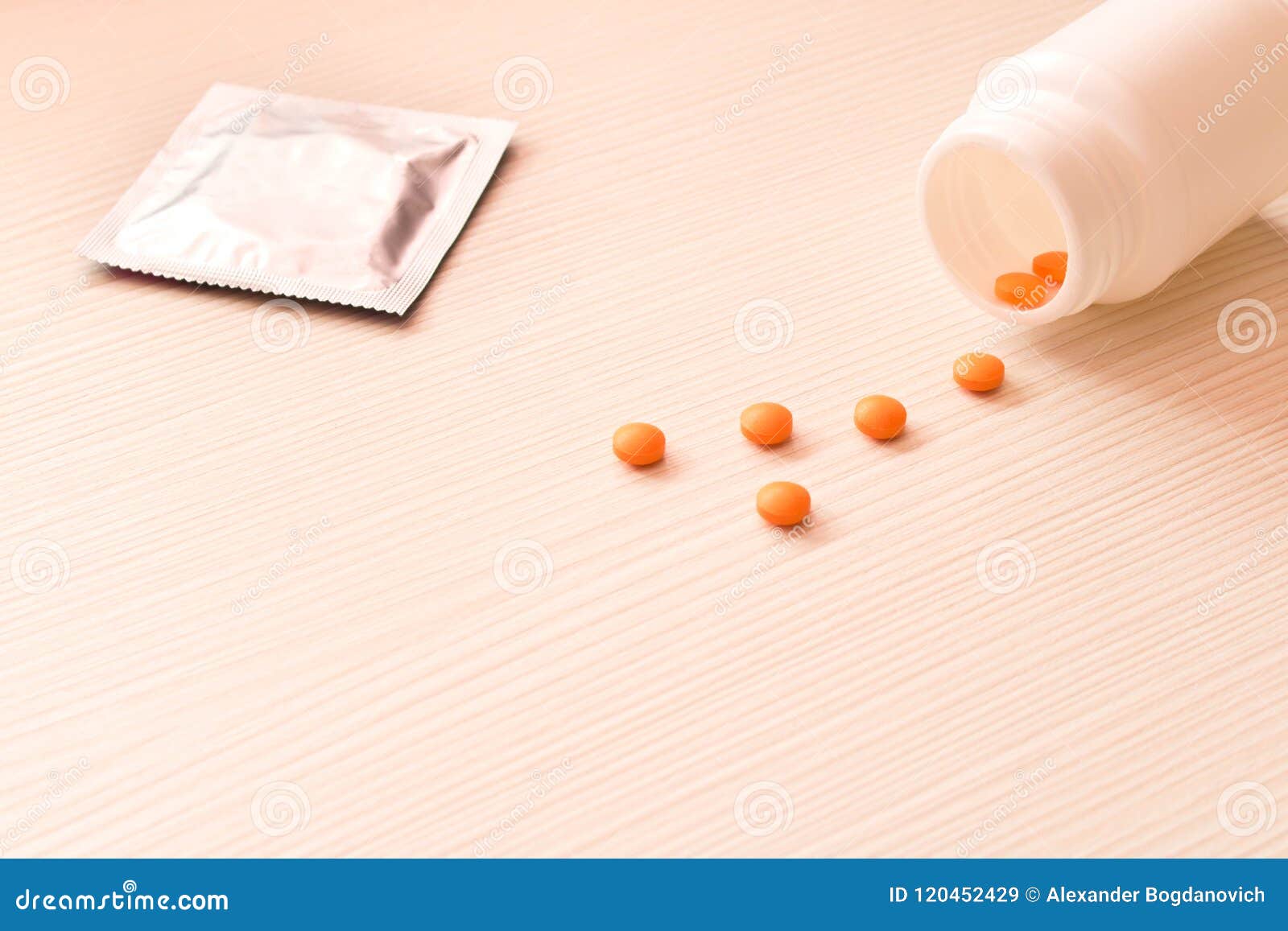 Birth Control Pills and Condom on Light Background. the Concept Stock ...