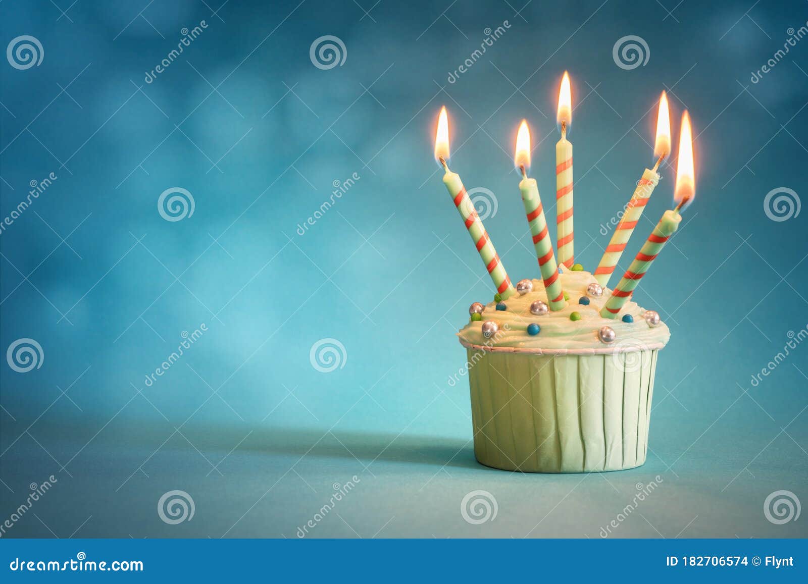 Birthday Cupcake on Blue Background Stock Photo - Image of baked ...