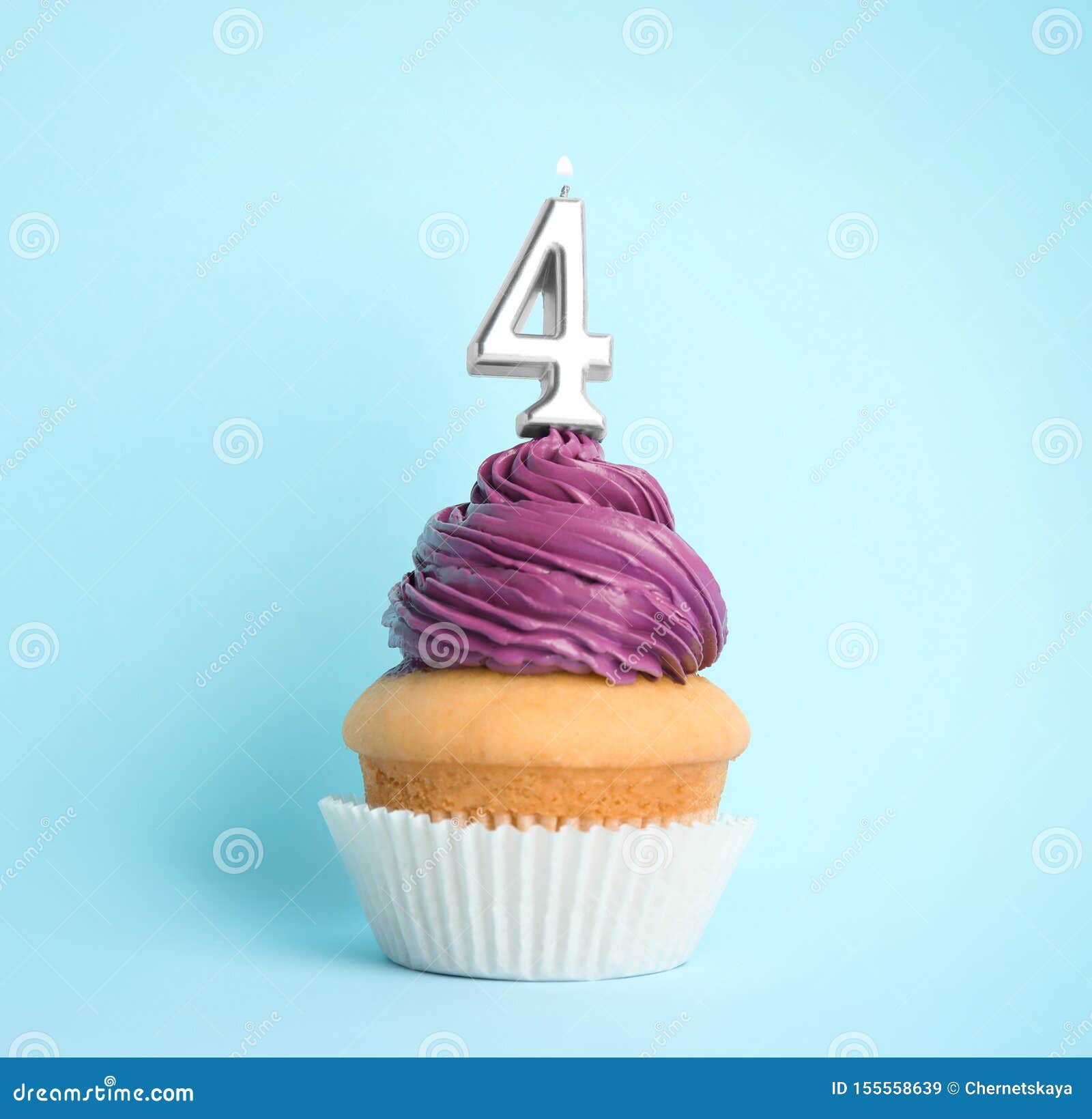 Birthday Cupcake with Number Four Candle on Blue Backgound Stock Image ...