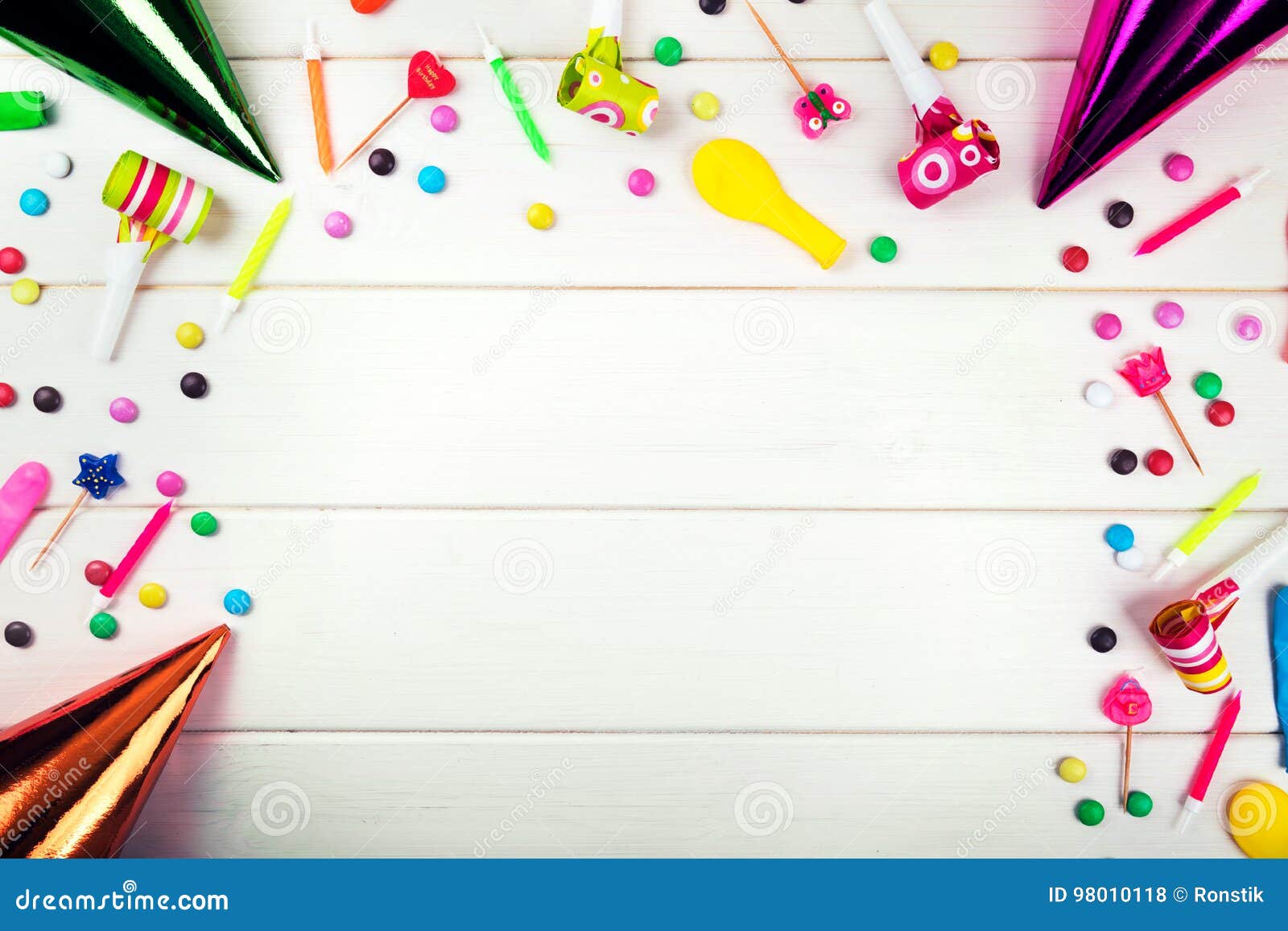 Birthday Party Items and Decorations on White Wood Background Stock ...