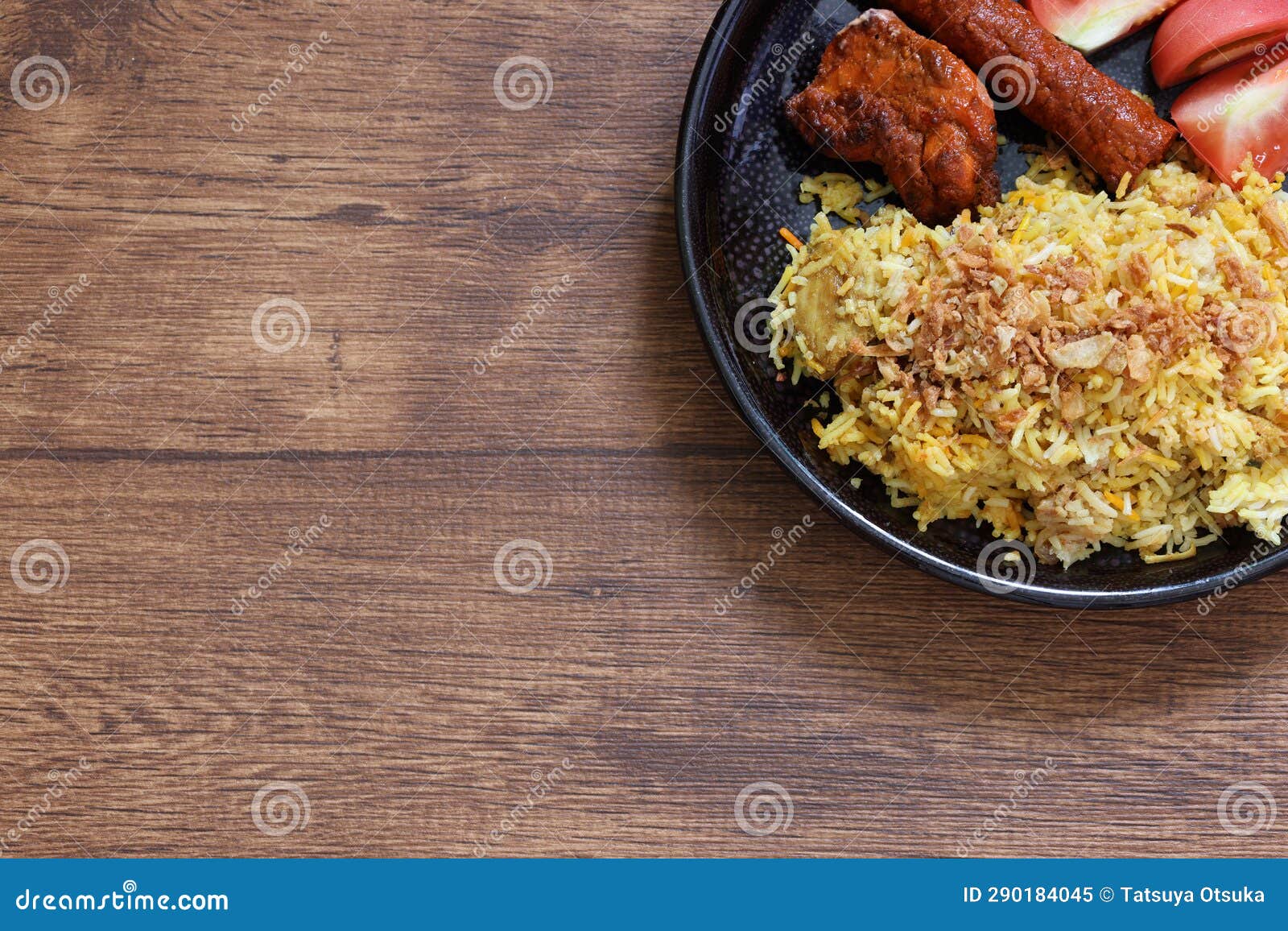 Biryani on the Black Dish on the Wooden Table Stock Image - Image of ...