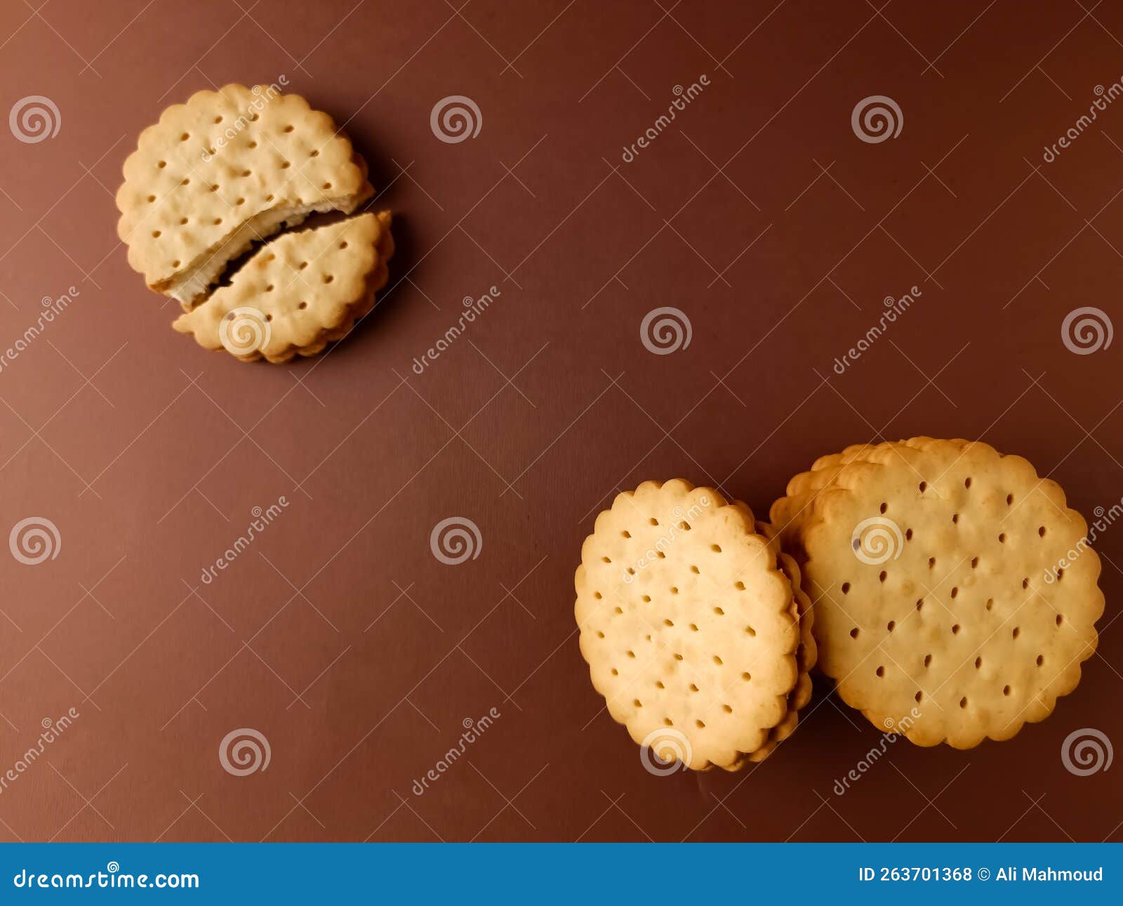 Biscuits and Broken Biscuit , Round Biscuits on Brown Background Stock ...