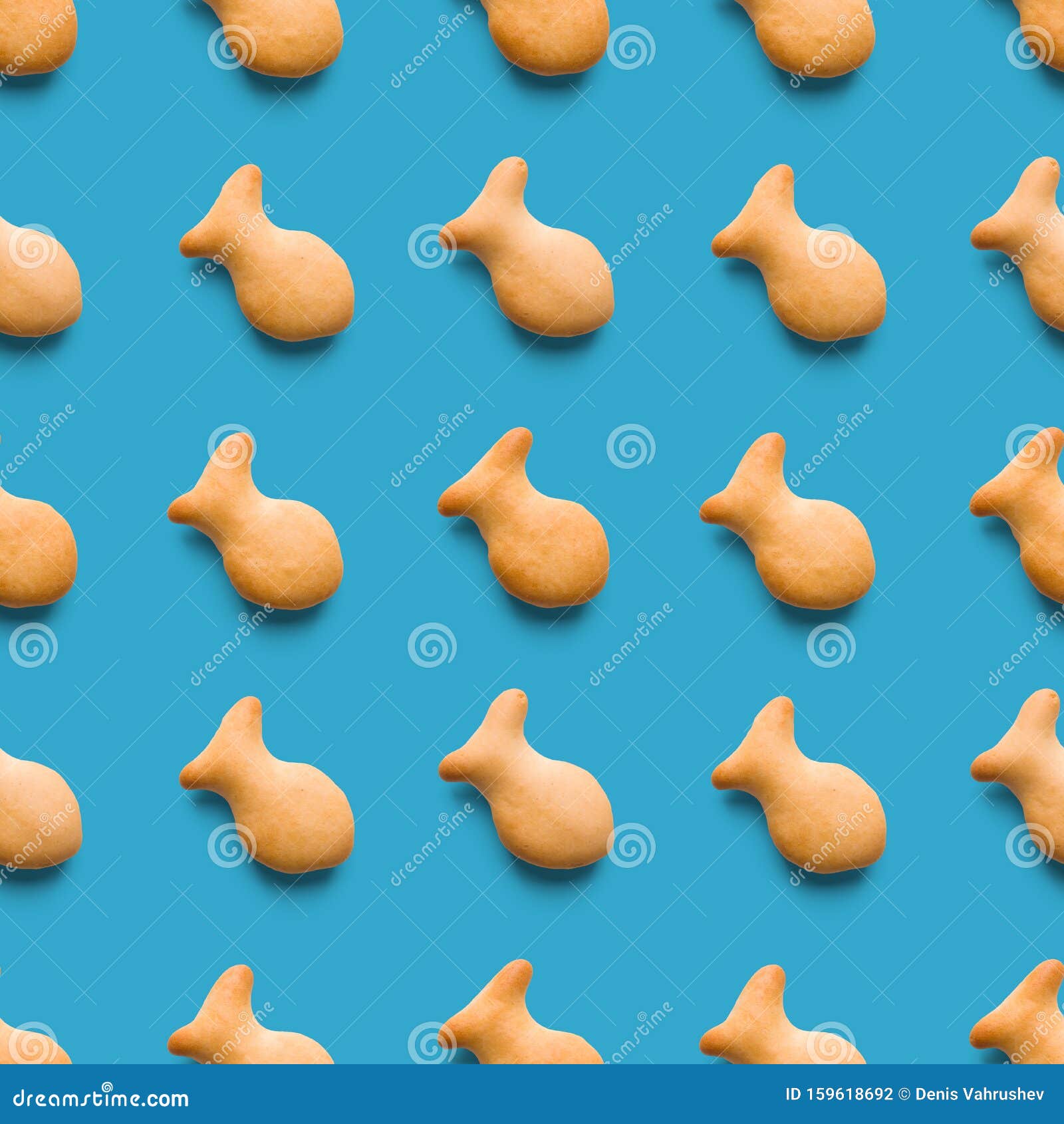 Rounded Fresh Crispy Fish Shaped Cookies on Light Blue Background ...