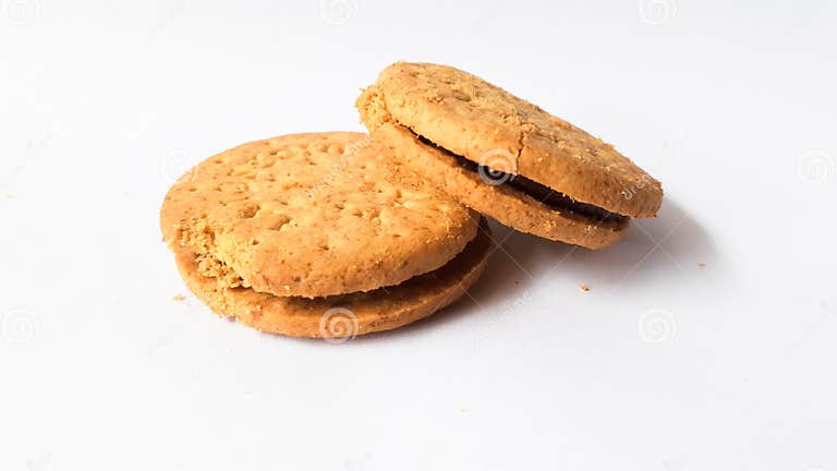 BISCUITS - Delicious Wheat Round Biscuits with a Few Crumbs Isolated on ...