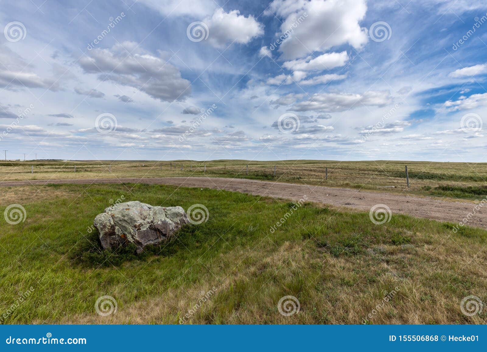 Bison Stone in the Prairie of Canada Stock Photo - Image of cloud ...