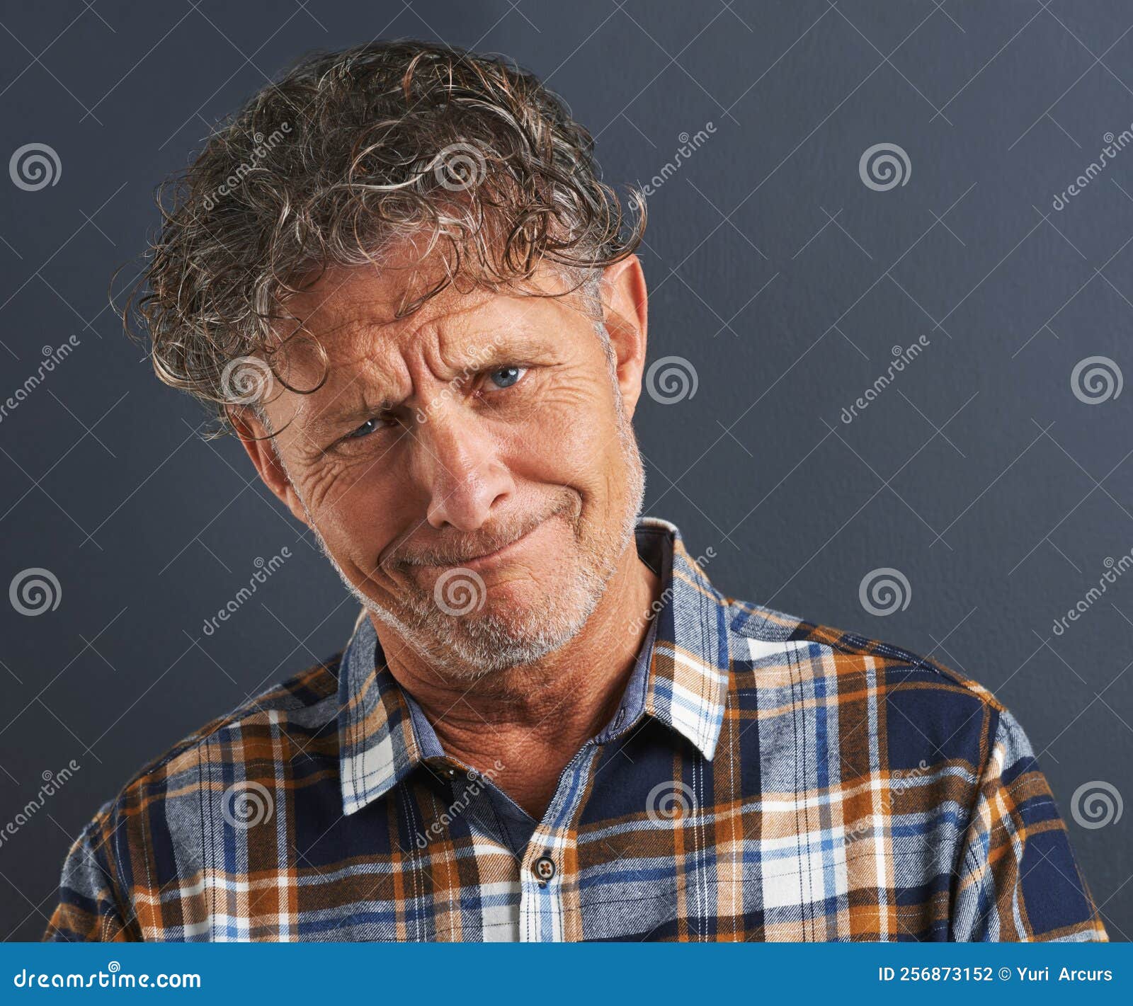 A Bit Befuddled. a Cropped Portrait of a Confused-looking Mature Man ...