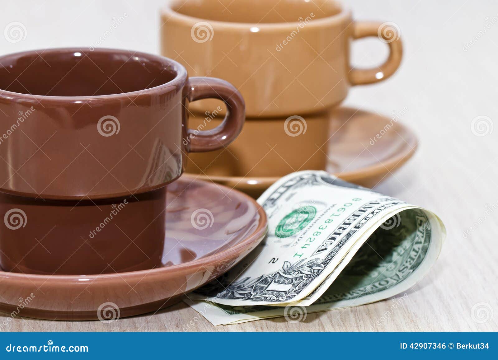 Bit of Cash Lying Under an Empty Coffee Cup Stock Photo - Image of ...