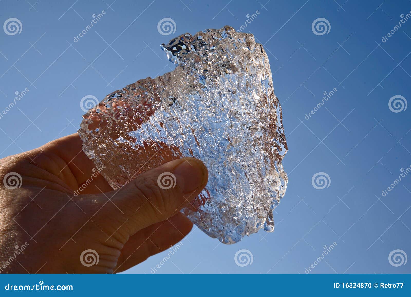 Bit of ice in hand stock photo. Image of coldly, clear - 16324870