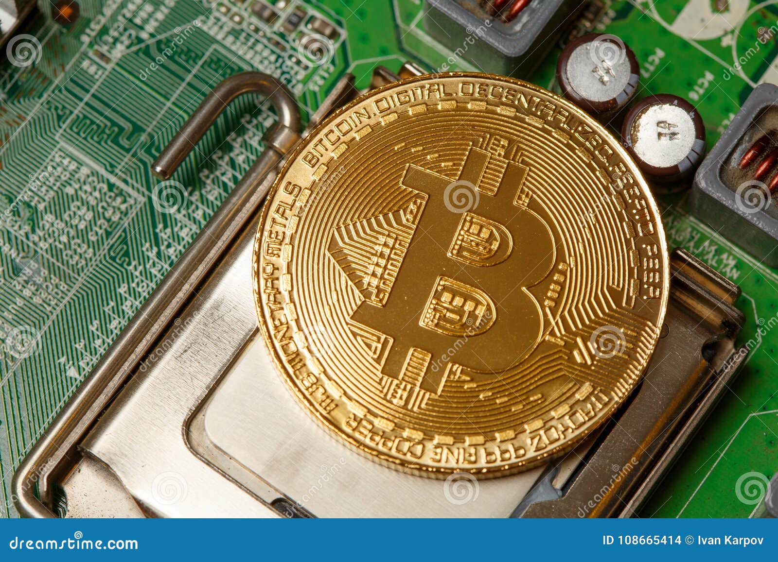 Golden Bitcoin Cryptocurrency on Computer Circuit Board. Macro Shot ...