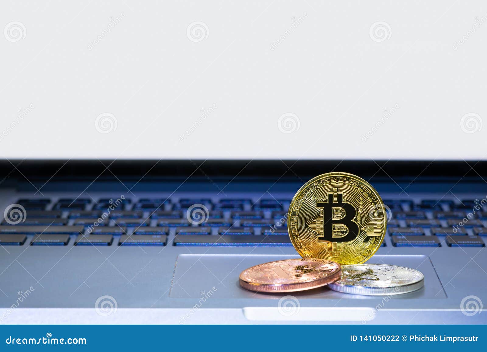Bitcoin Coins on Laptop Computer Track Pad Stock Photo - Image of asset ...