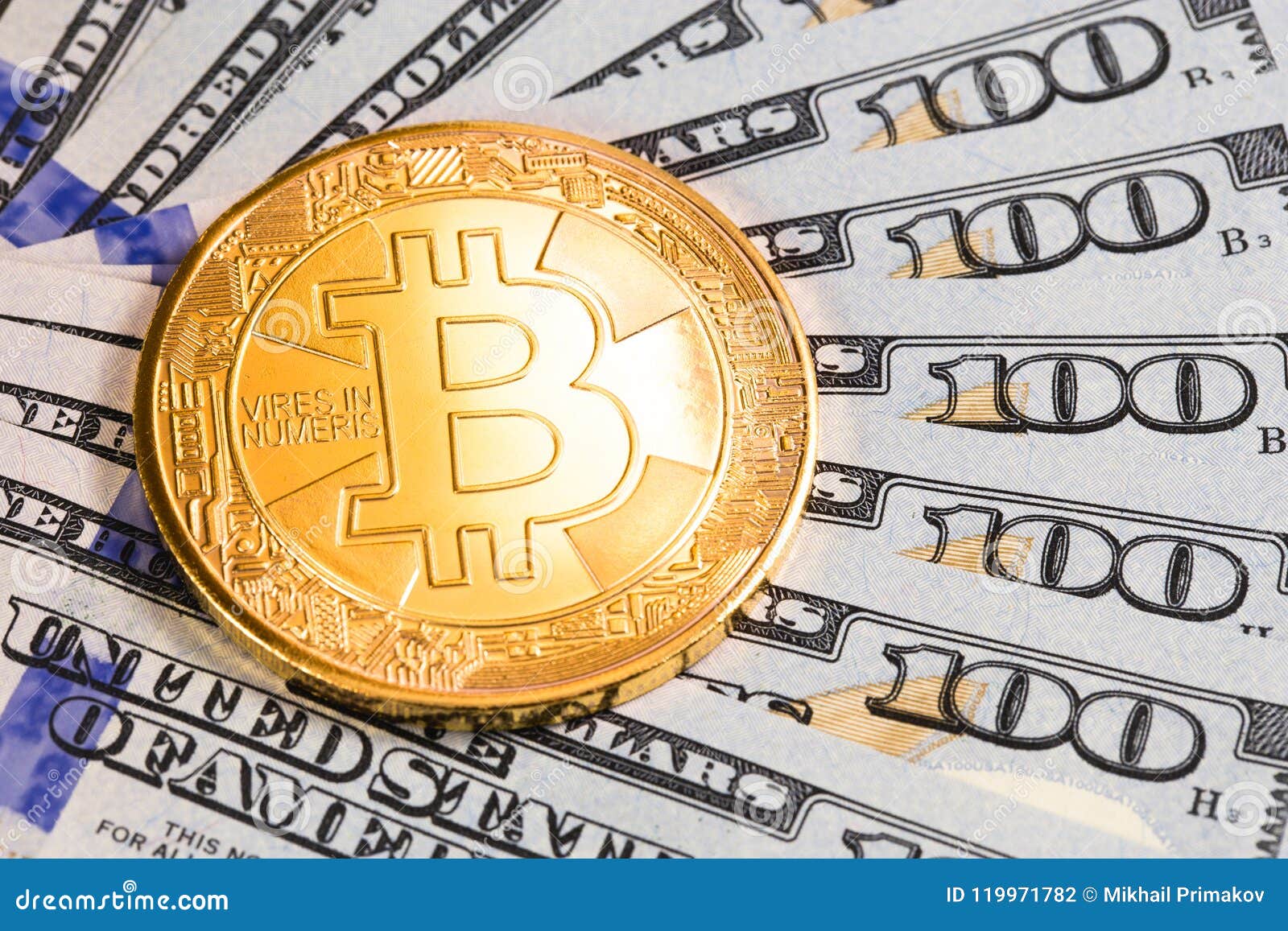 Bitcoin on dollars stock photo. Image of cryptography - 119971782