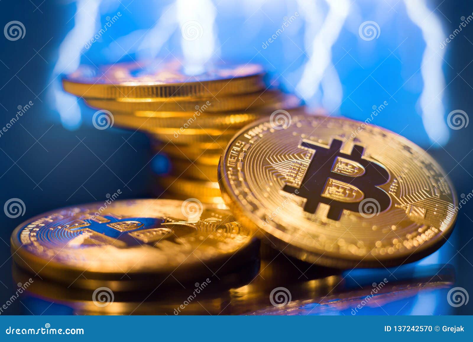 Bitcoin Gold Coins in Front of a Lightning Network Stock Photo - Image ...