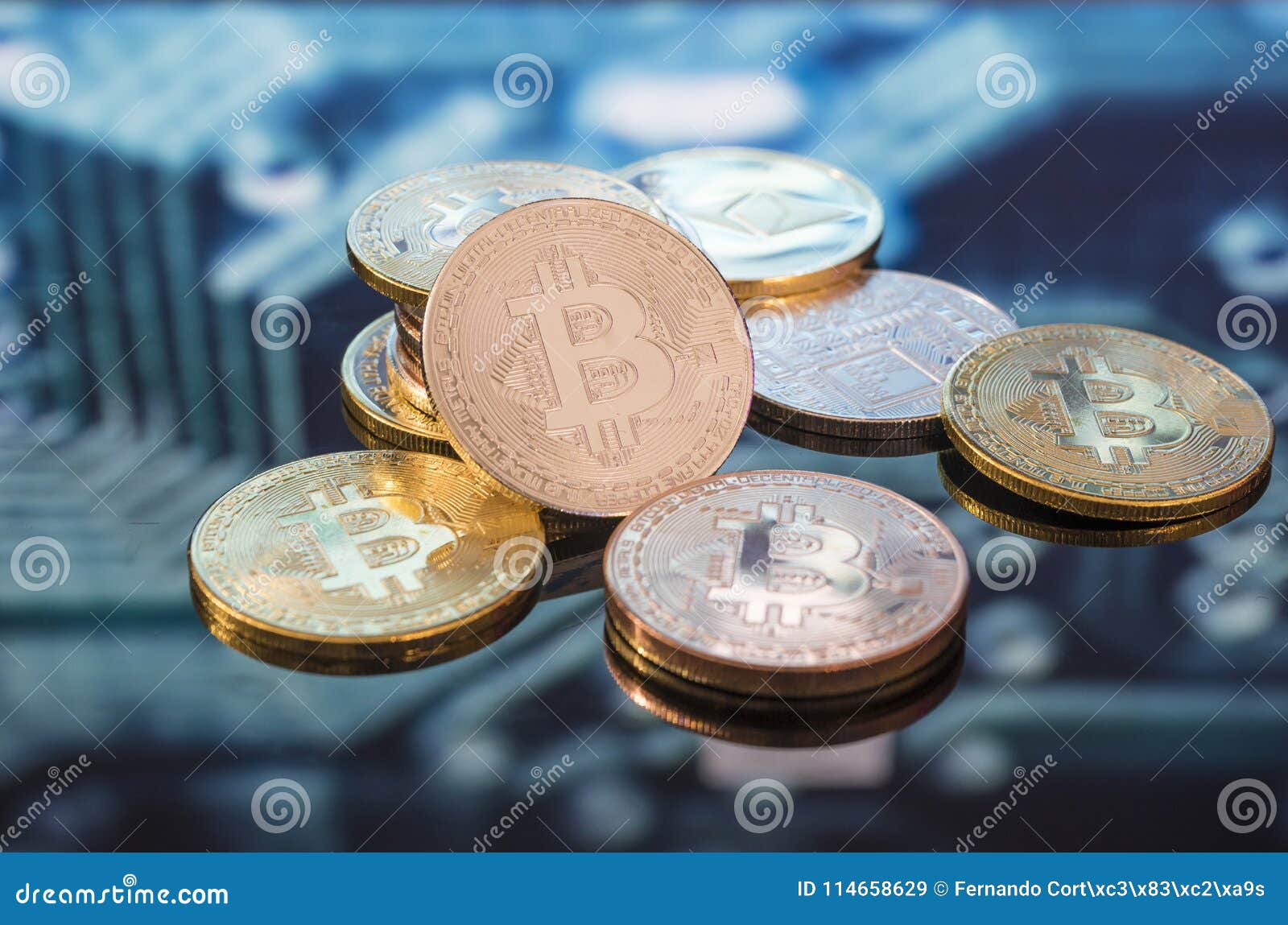 Bitcoin Gold, Silver and Copper Coins and Defocused Printed Circ Stock ...