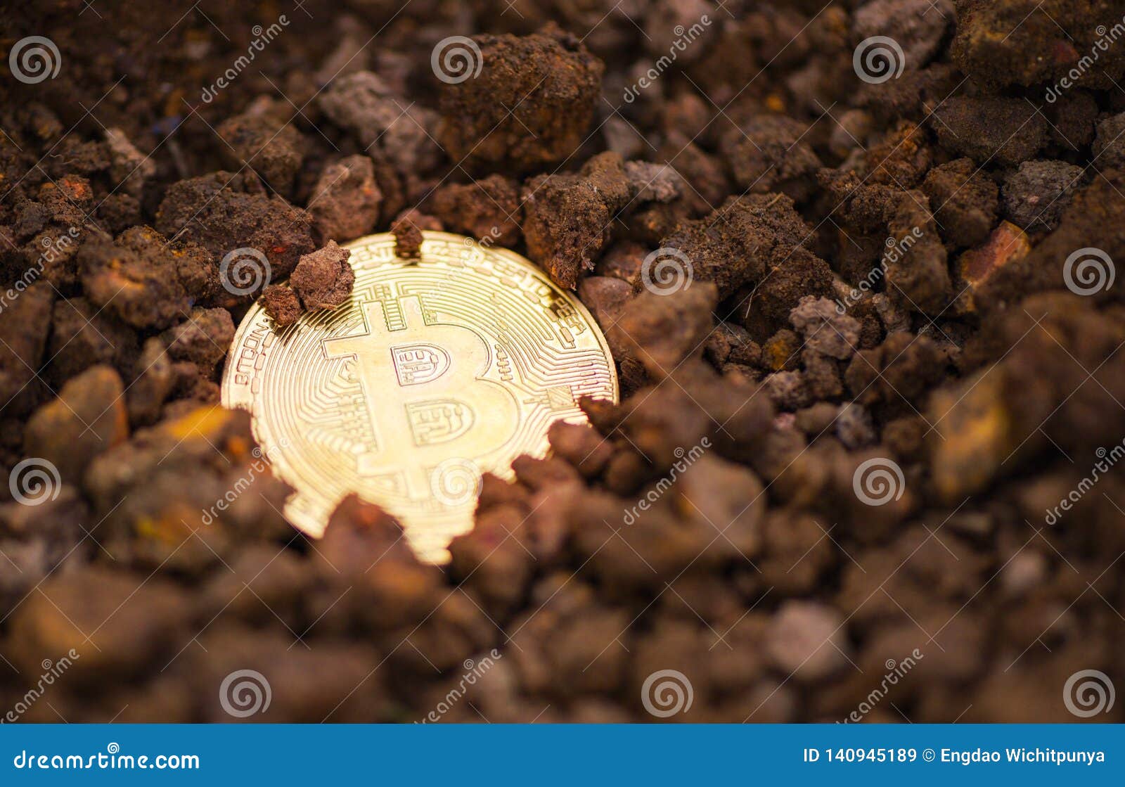 Bitcoin Golden on Ground Soil Deep with Light Virtual Cryptocurrency ...