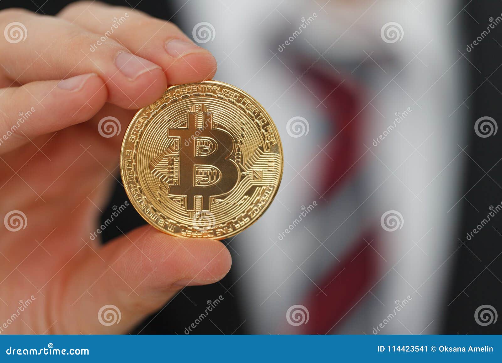 Bitcoin in the hand stock image. Image of market, coin - 114423541
