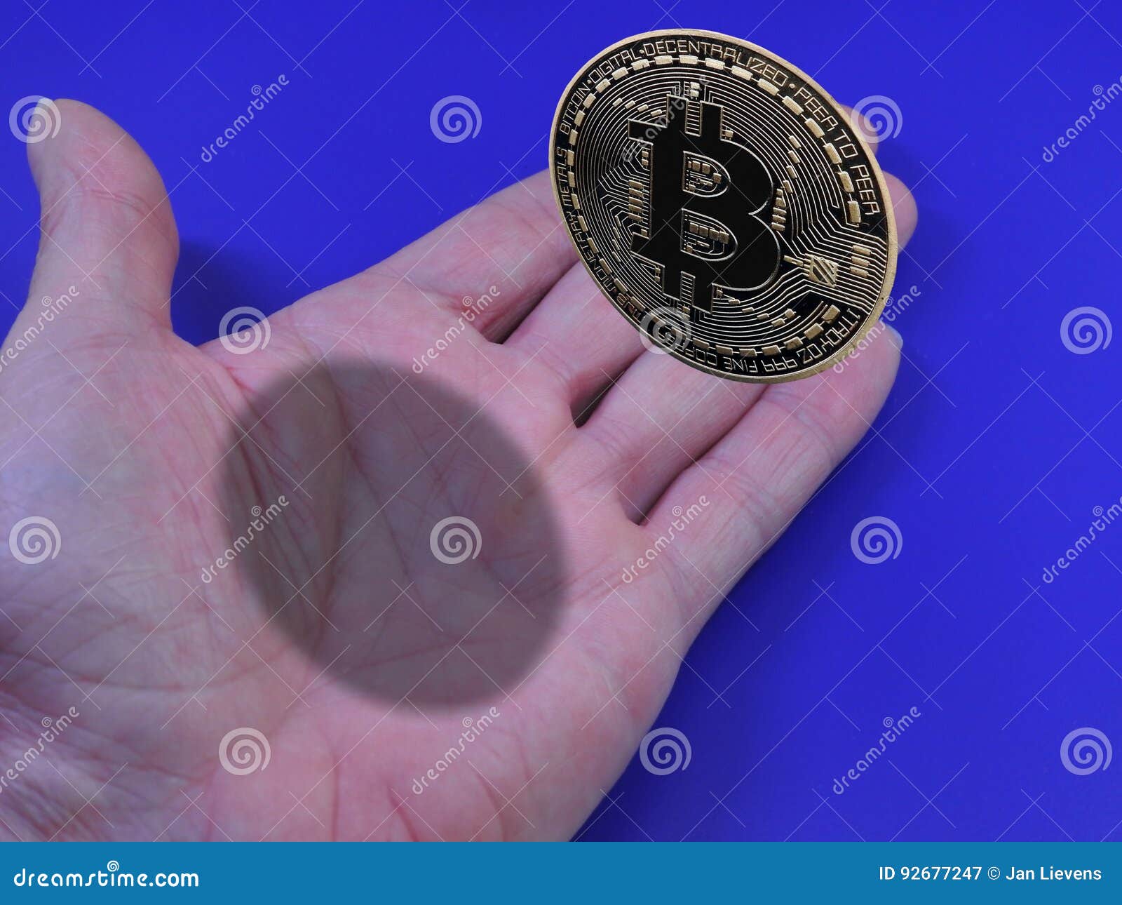 Bitcoin in hand stock image. Image of invest, bank, concept - 92677247