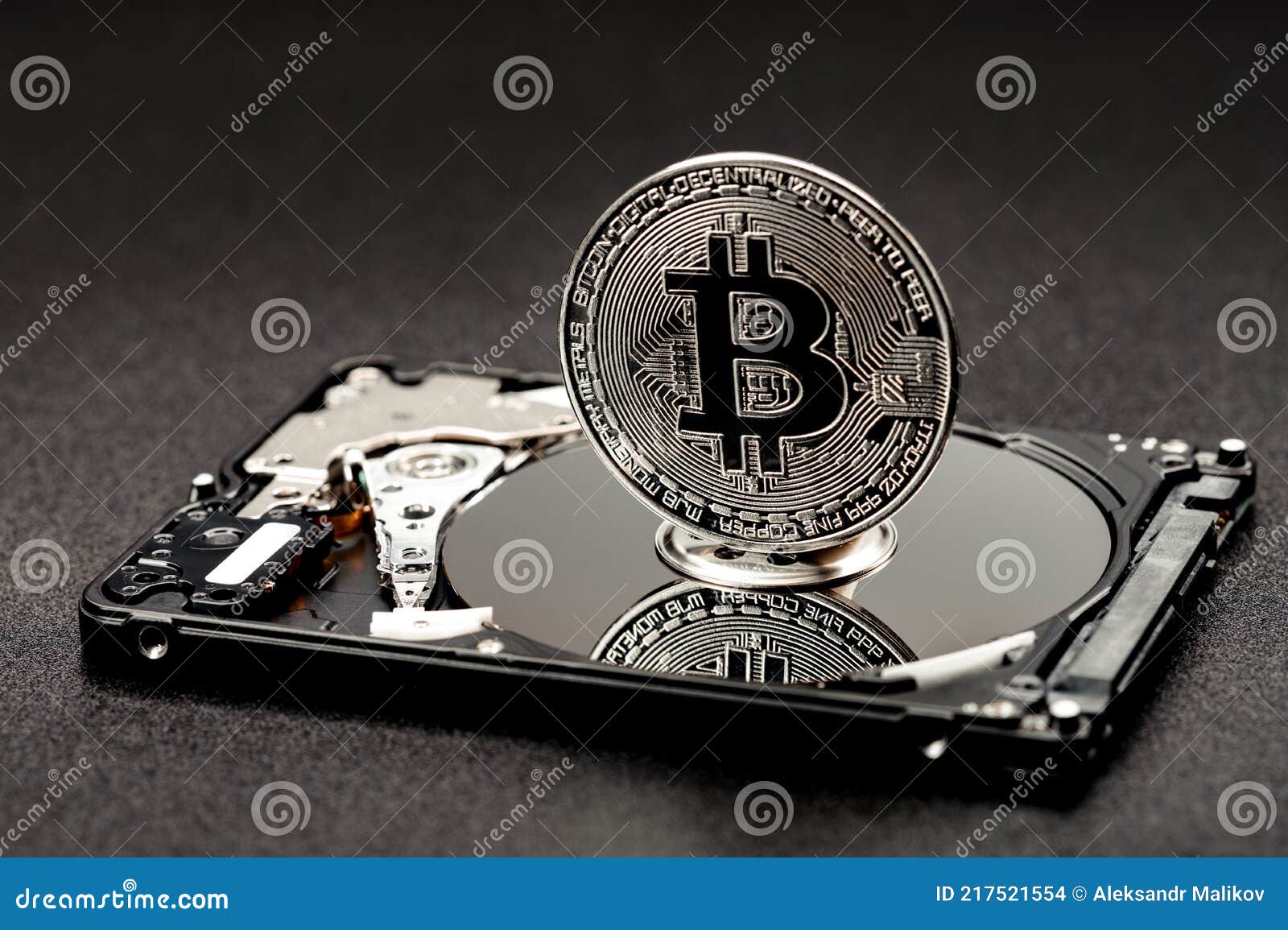 Bitcoin on a Hard Disk on a Black Background, the Concept of Mining ...