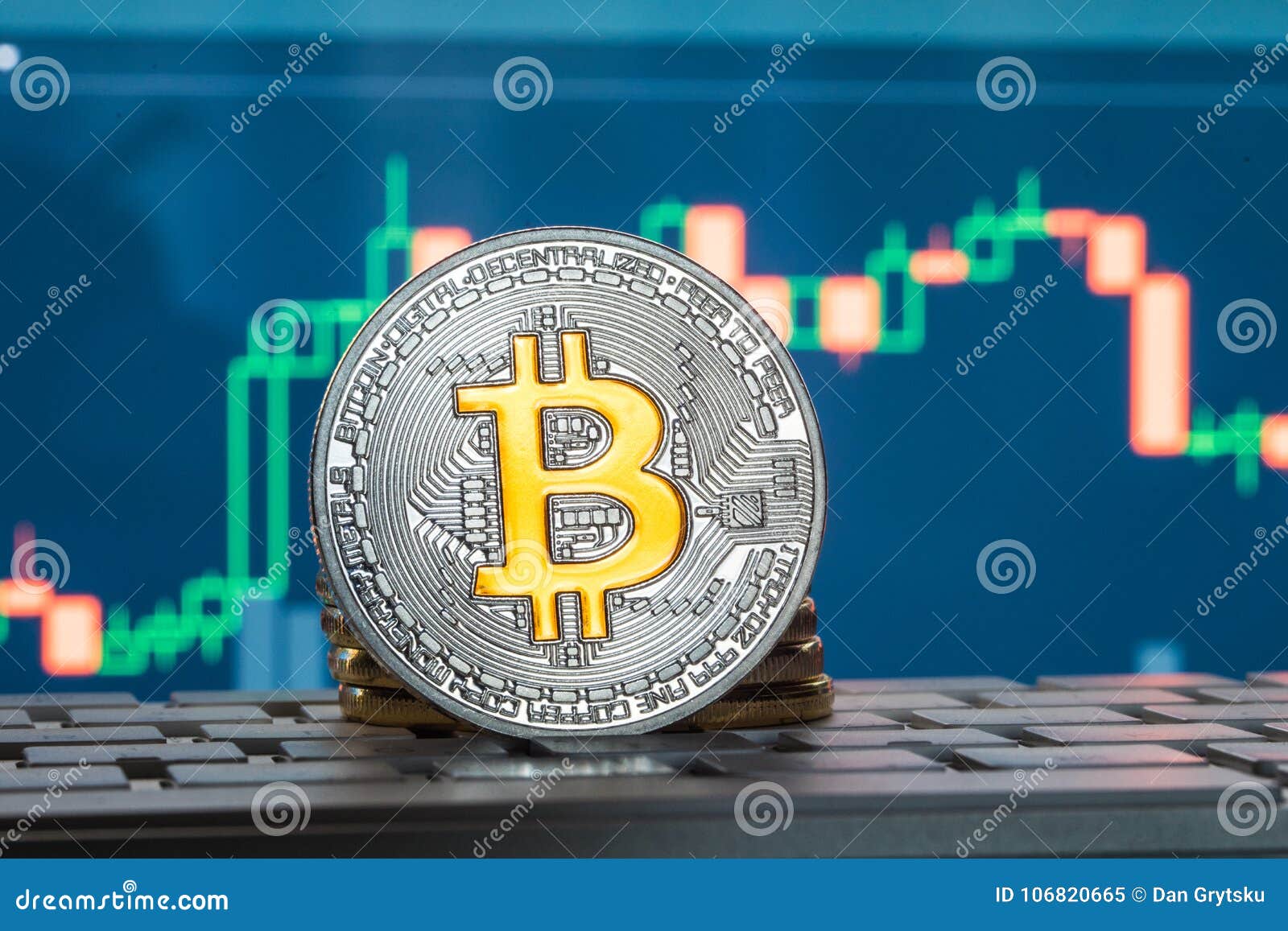 Bitcoin Rising Concept on Laptop Keyboard Chart and Silver Bitcoin ...