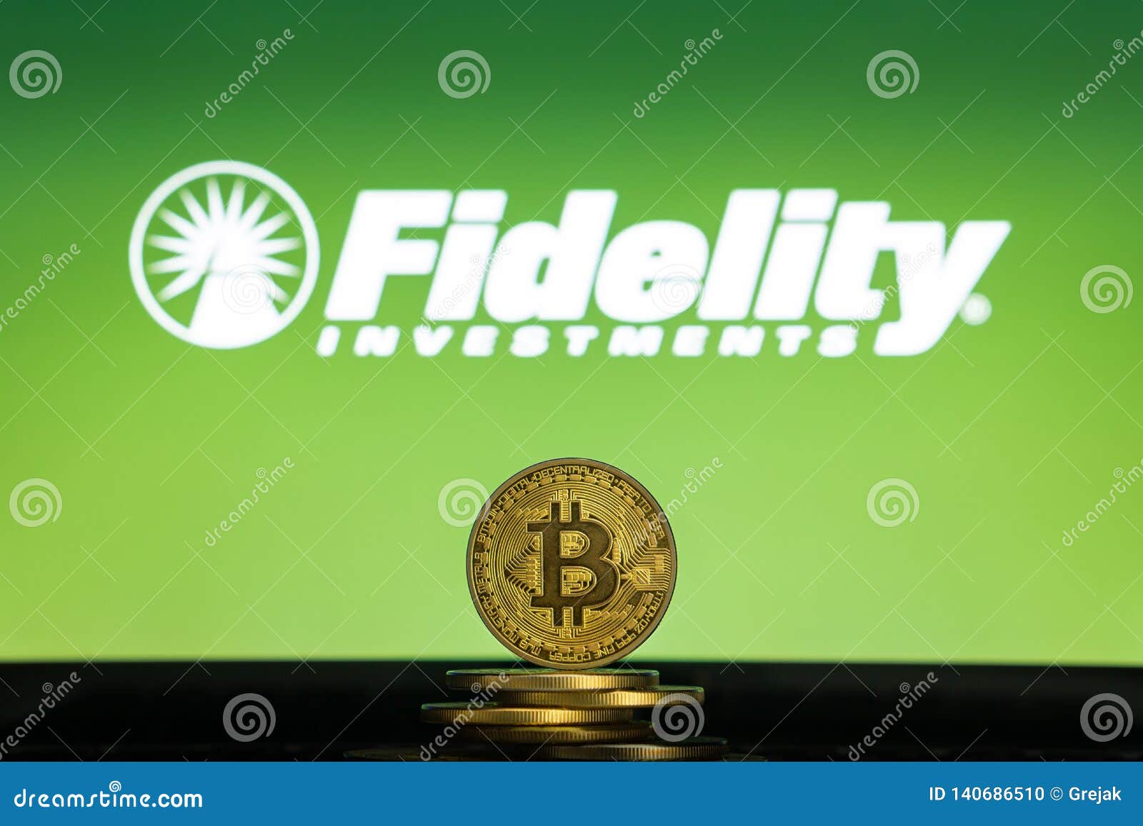 Fidelity Logo on a Computer Screen with a Stack of Bitcoin ...