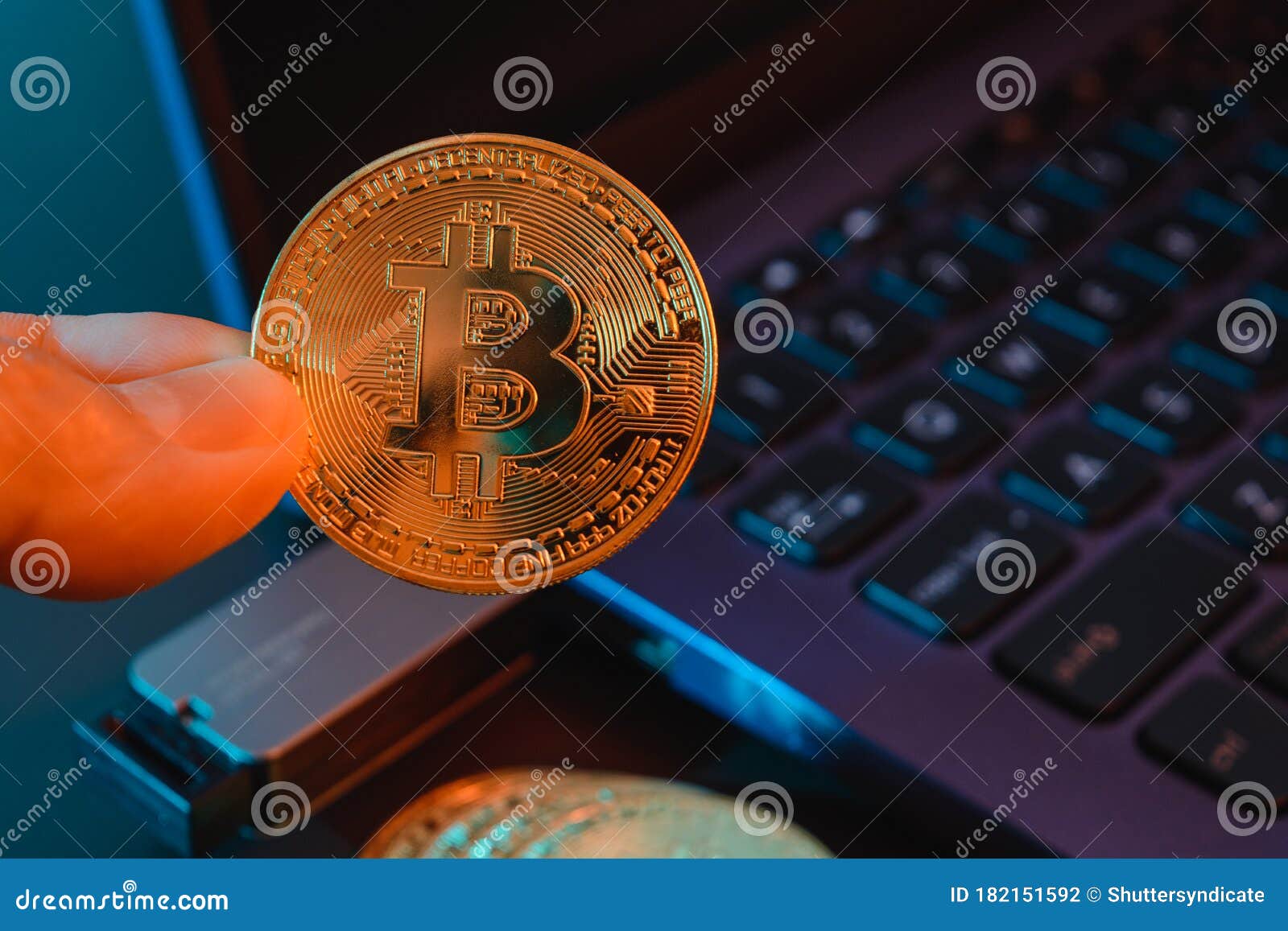 Bitcoins with Digital Ledger Connected To Laptop Device Stock Photo ...