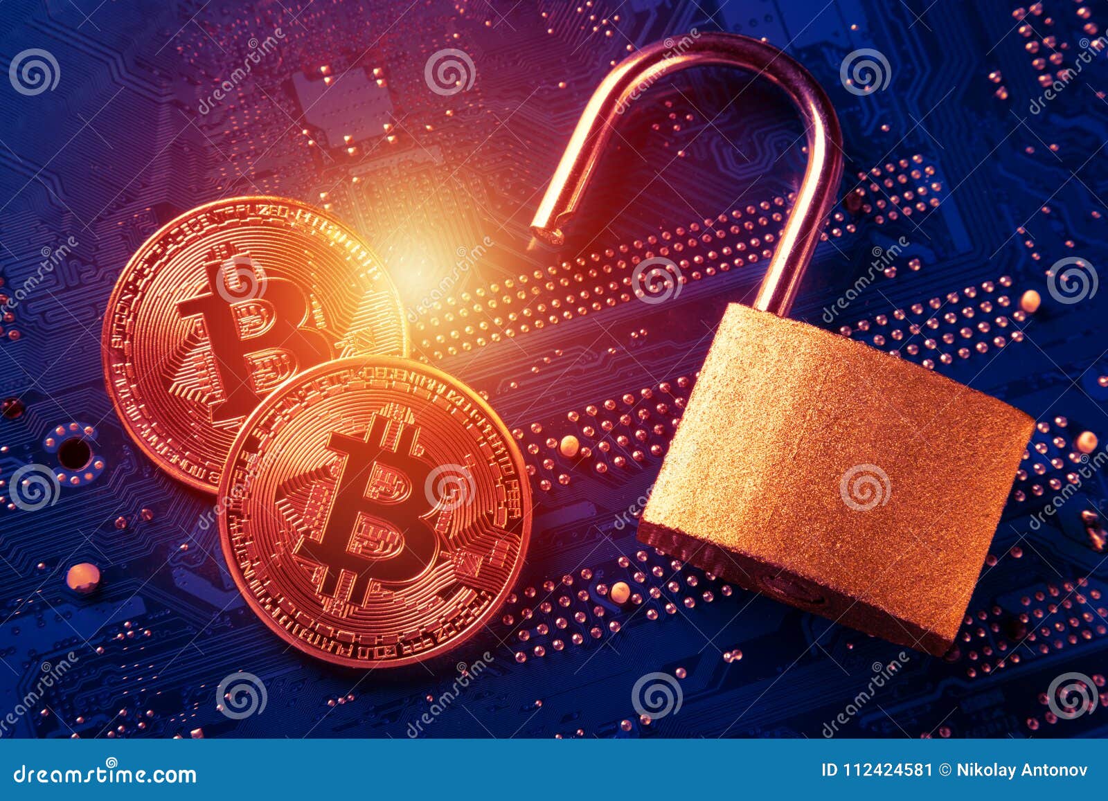 Bitcoins with Opened Padlock on Computer Motherboard. Crypto Currency ...