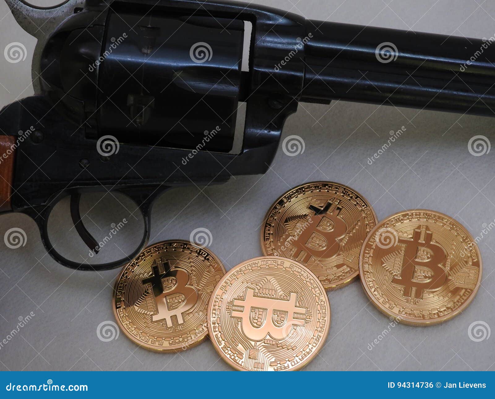 Bitcoins and revolver stock photo. Image of crime, bitcoin - 94314736