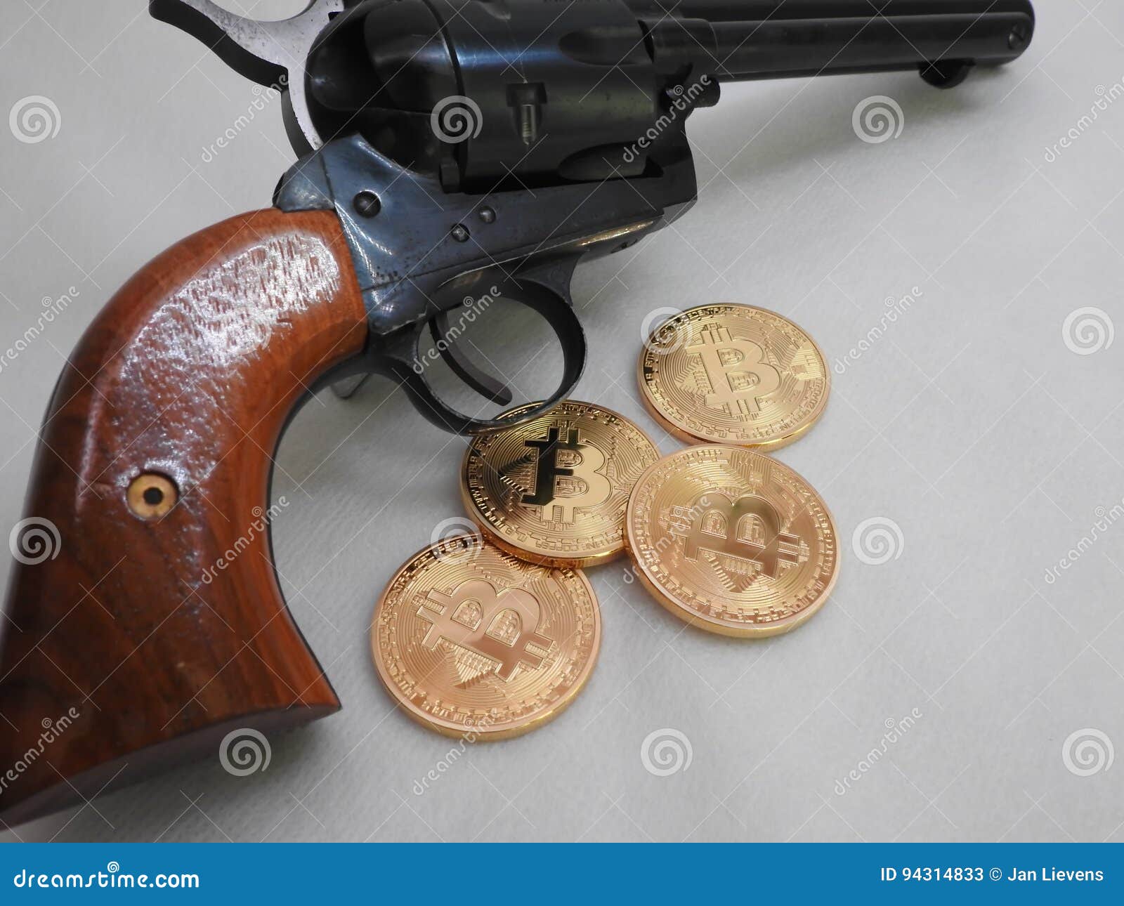Bitcoins and revolver stock image. Image of cash, criminal - 94314833