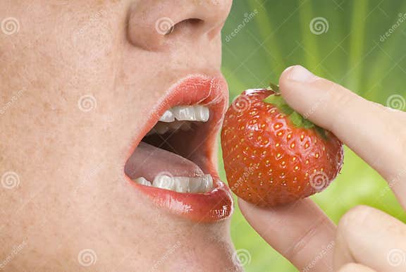 The bite stock photo. Image of attractive, strawberry - 5119462