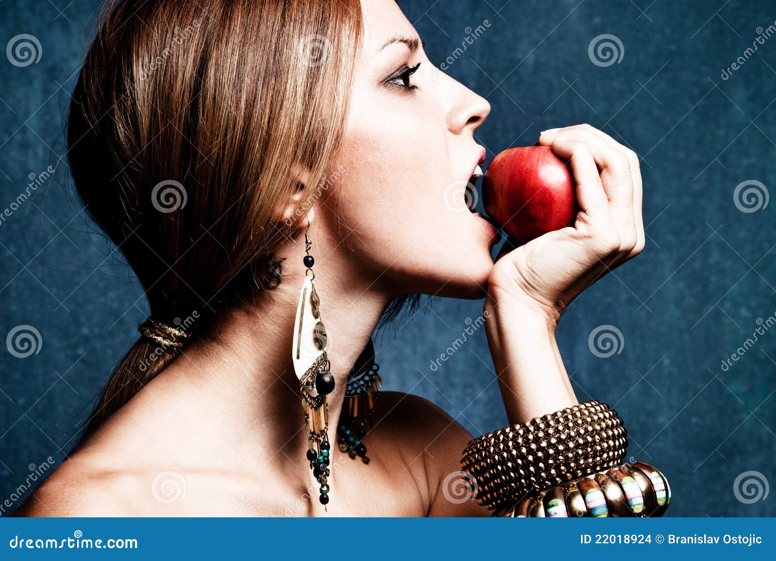 Bite an apple stock photo. Image of hold, young, oriental - 22018924